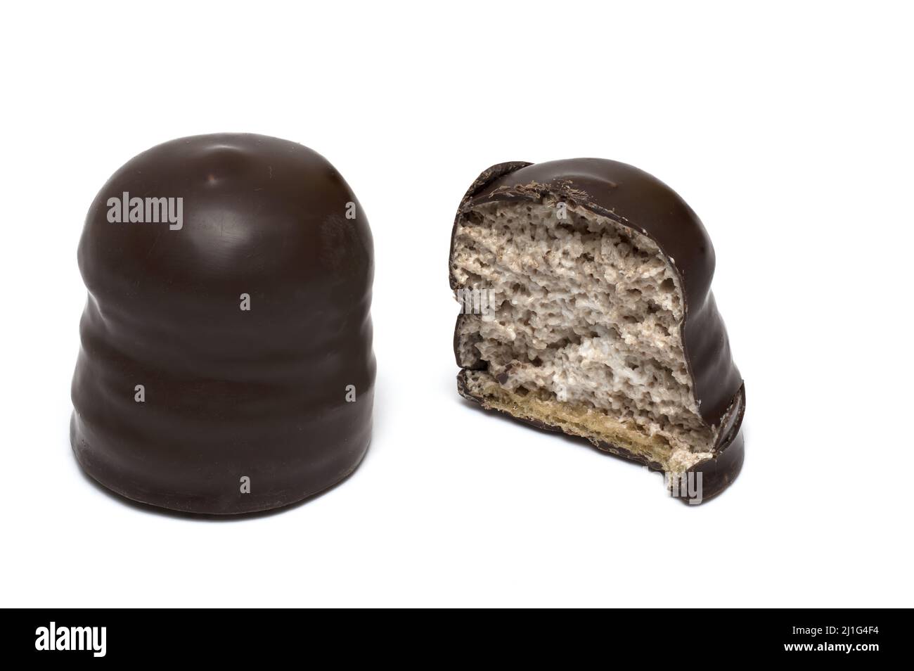 Close up of chocolate coated marshmallow fitted on cookie filled with ...