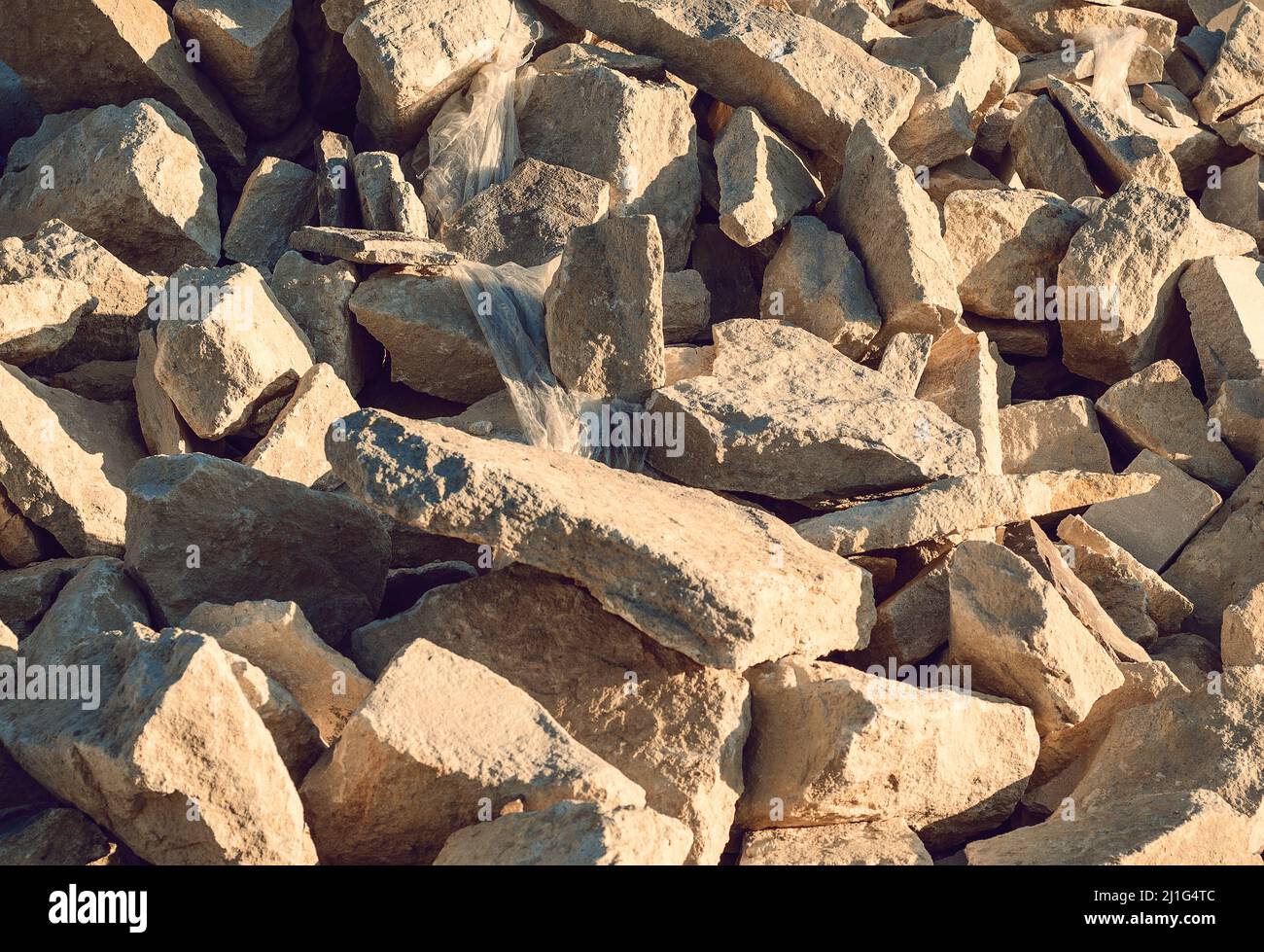 Stone, large chipped pieces of rubble. Construction background Stock ...