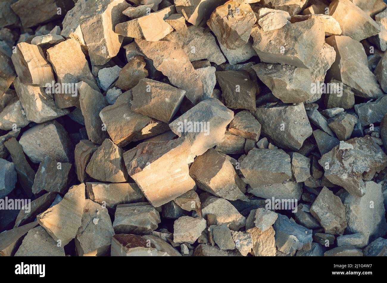 Stone, large chipped pieces of rubble. Construction background Stock ...