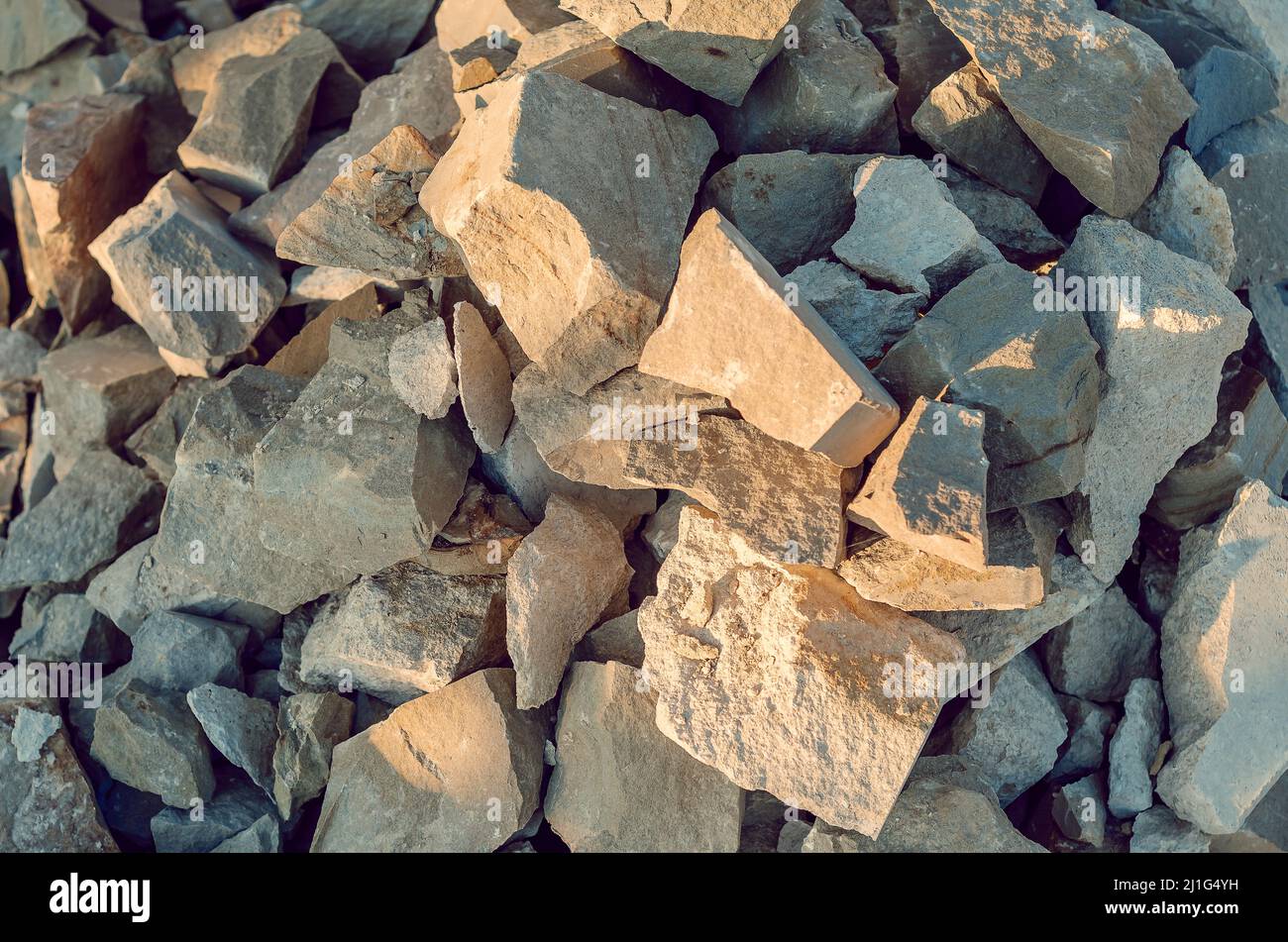 Stone, large chipped pieces of rubble. Construction background Stock ...