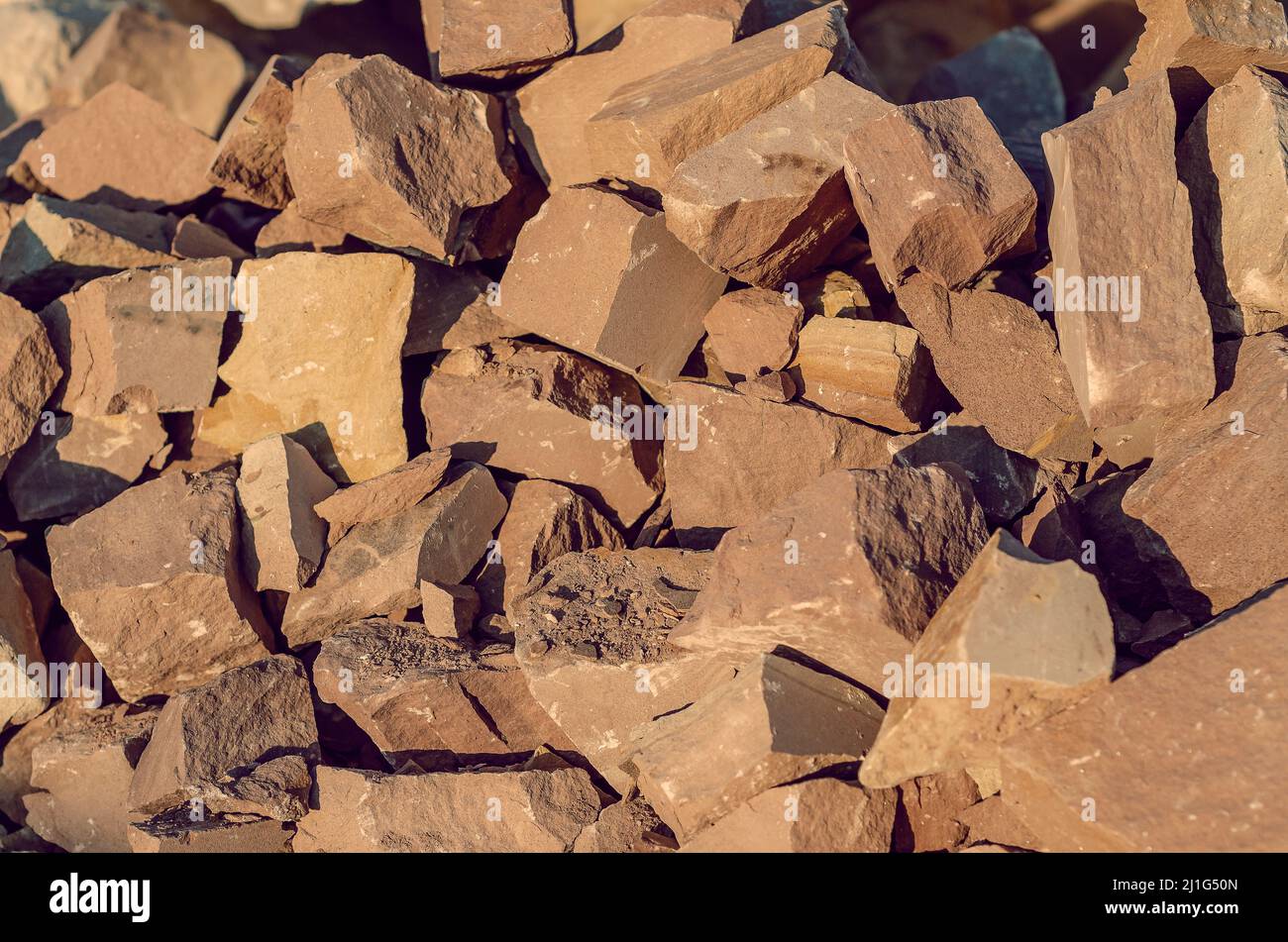 Stone, large chipped pieces of rubble. Construction background Stock ...