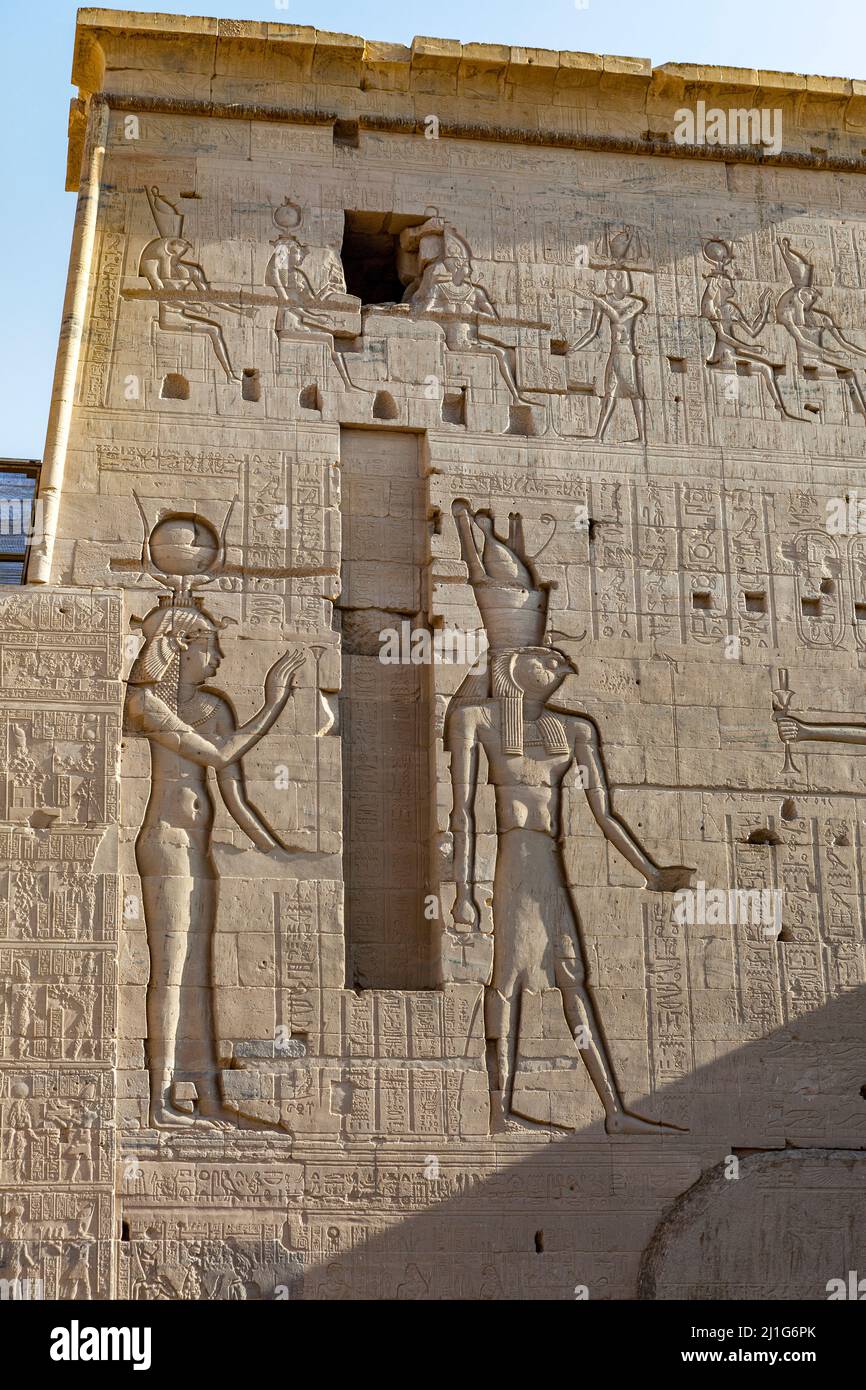 Bas-relief carvings of Horus and Isis, second pylon of the Temple of ...