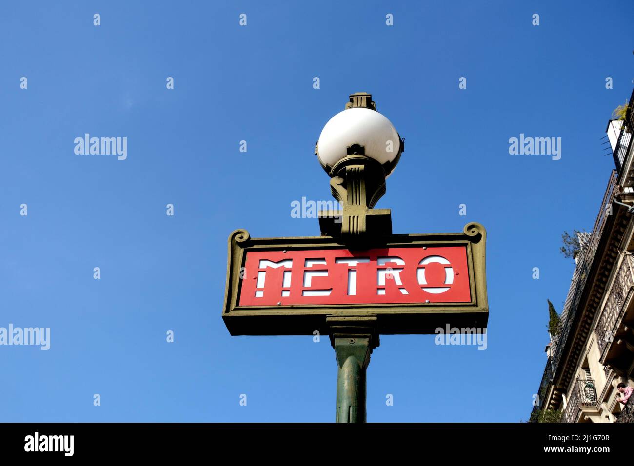 Metro sign in Paris, France on blue sky background Stock Photo - Alamy