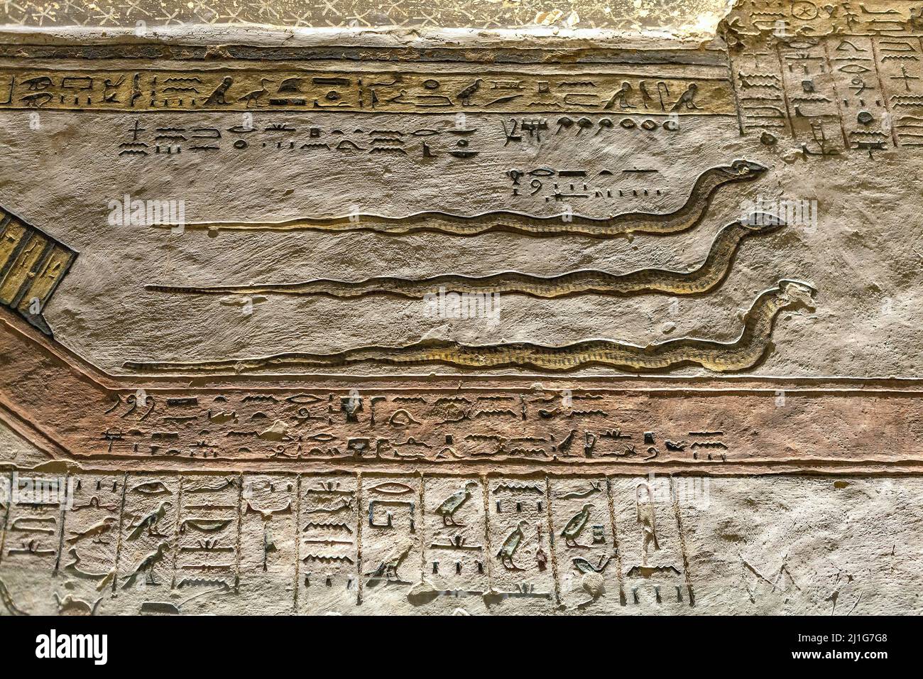 Painted bas-relief of three snakes guarding the Path of Fire in the ...
