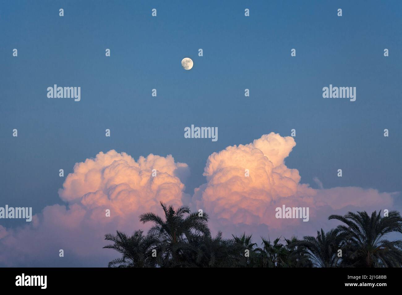 Moon above clouds hi-res stock photography and images - Alamy
