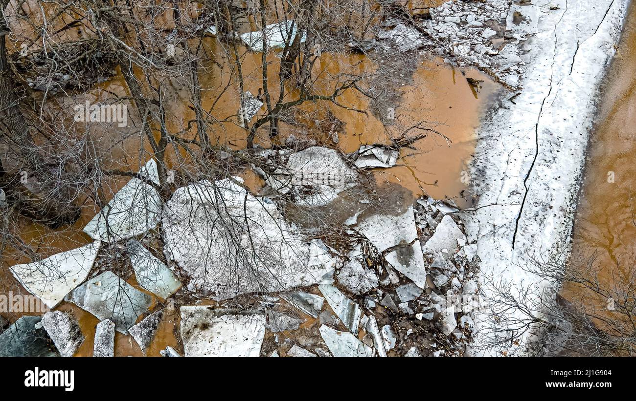 Spring rain broke away this frozen river into giant chunks of ice Stock ...