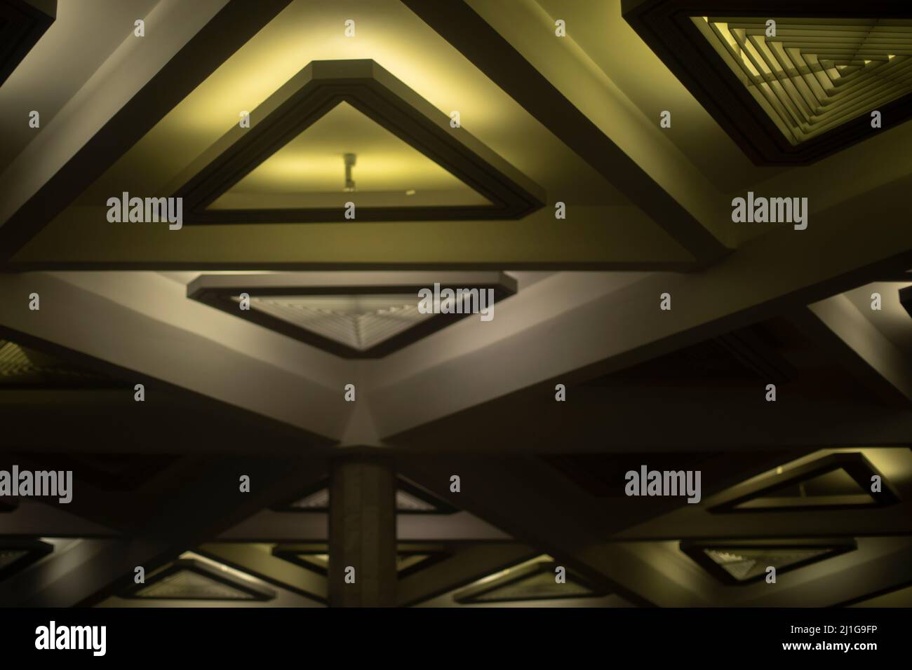 Light triangle. Lamp on ceiling. Light design. Architecture of 20th ...