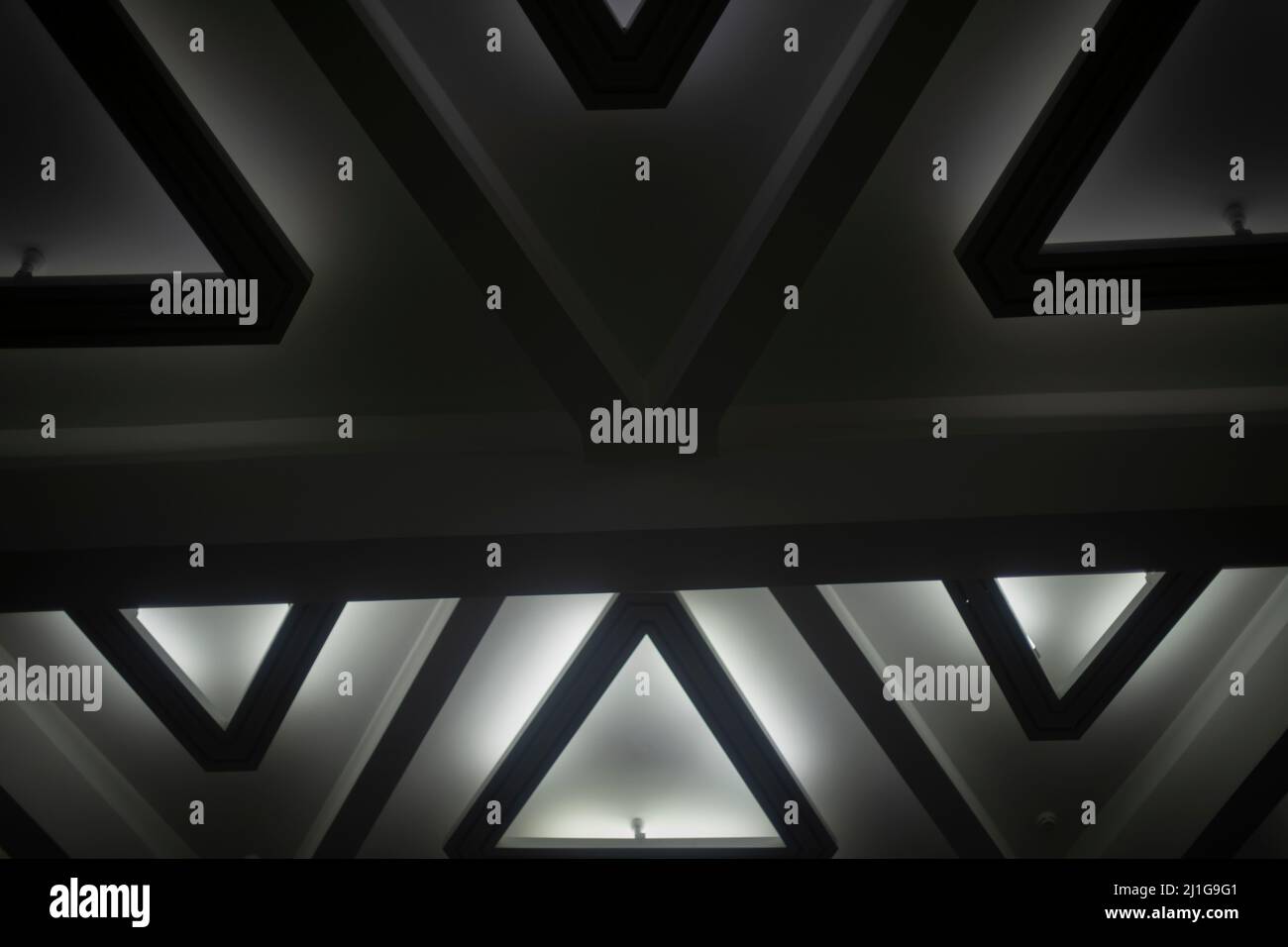 Light triangle. Lamp on ceiling. Light design. Architecture of 20th ...