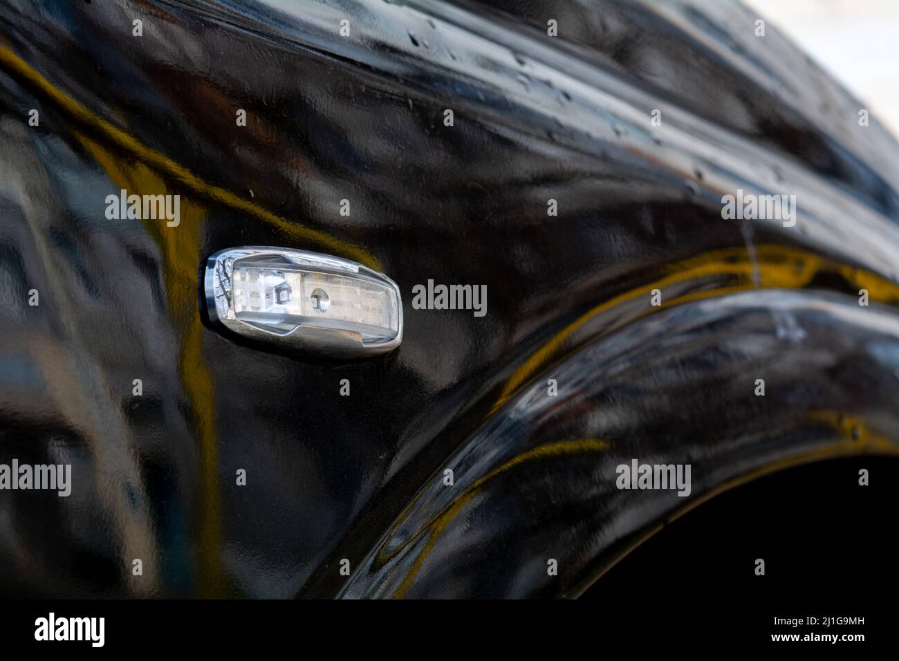 Turn signal repeater. Close-up of the turn signal repeater. Road safety ...