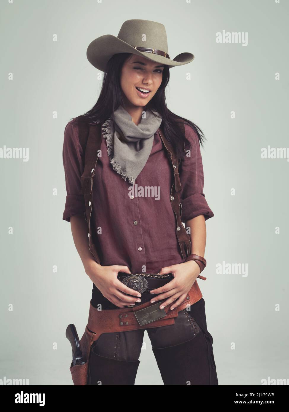 Hey cowboy.... Cropped shot of an attractive young woman in cowboy ...