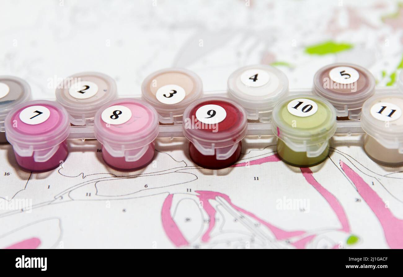 Multicolored acrylic paint palette for drawing a picture by number ...