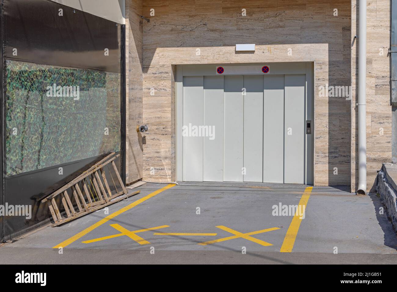 Elevator Lift Doors to Underground Parking Garage Stock Photo - Alamy