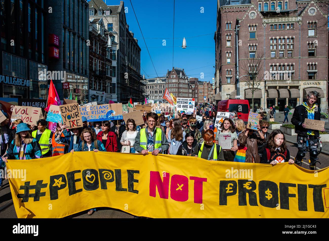 Amsterdam, Netherlands. 25th Mar, 2022. Protesters hold a banner and ...