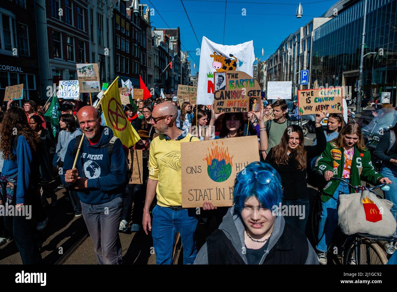 Amsterdam, Netherlands. 25th Mar, 2022. Protesters hold placards ...