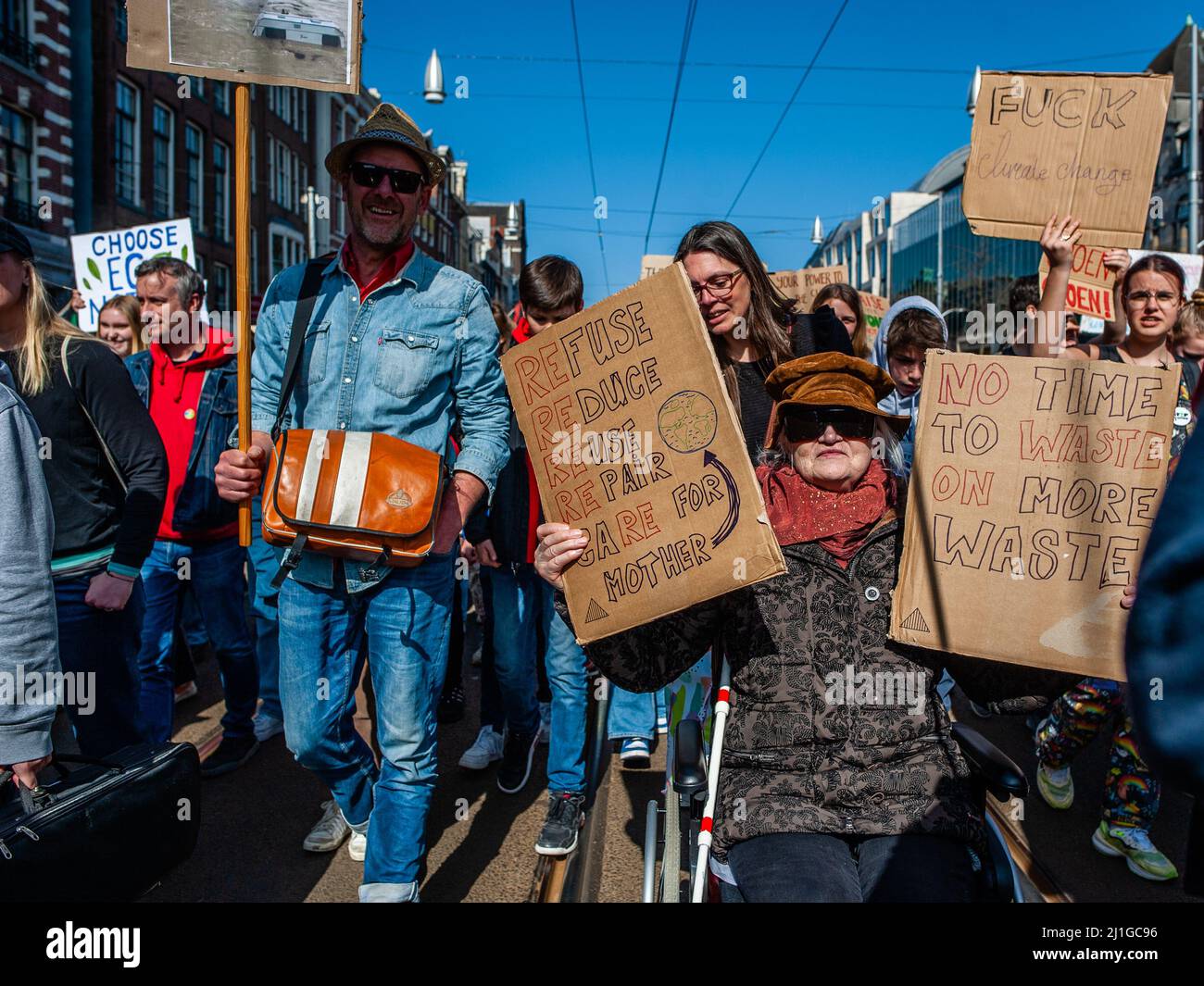 Amsterdam, Netherlands. 25th Mar, 2022. Protesters hold placards ...