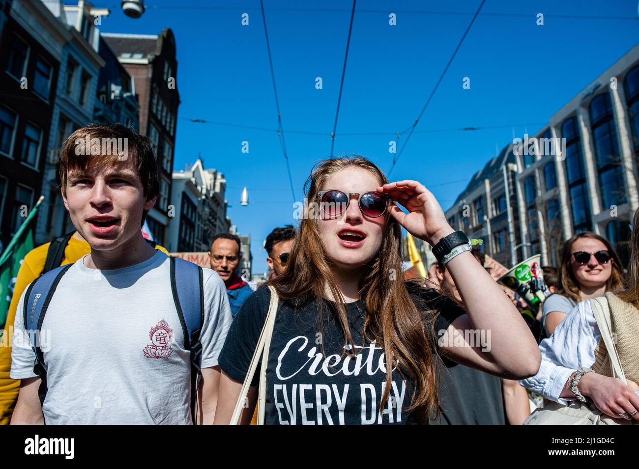 Protesters chant slogans against climate change during the ...