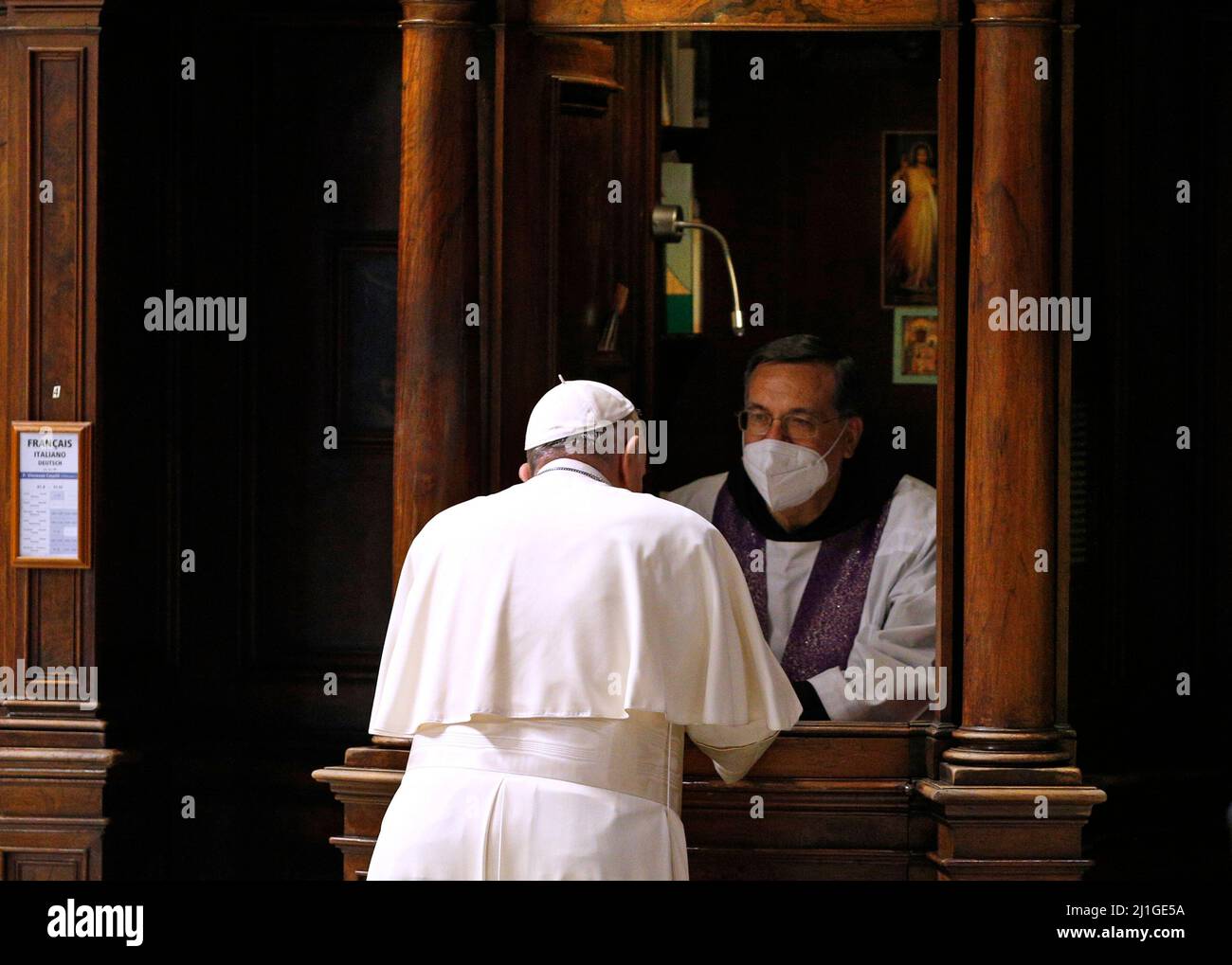 Vatican. 25th Mar, 2022. Pope Francis goes to confession during a ...