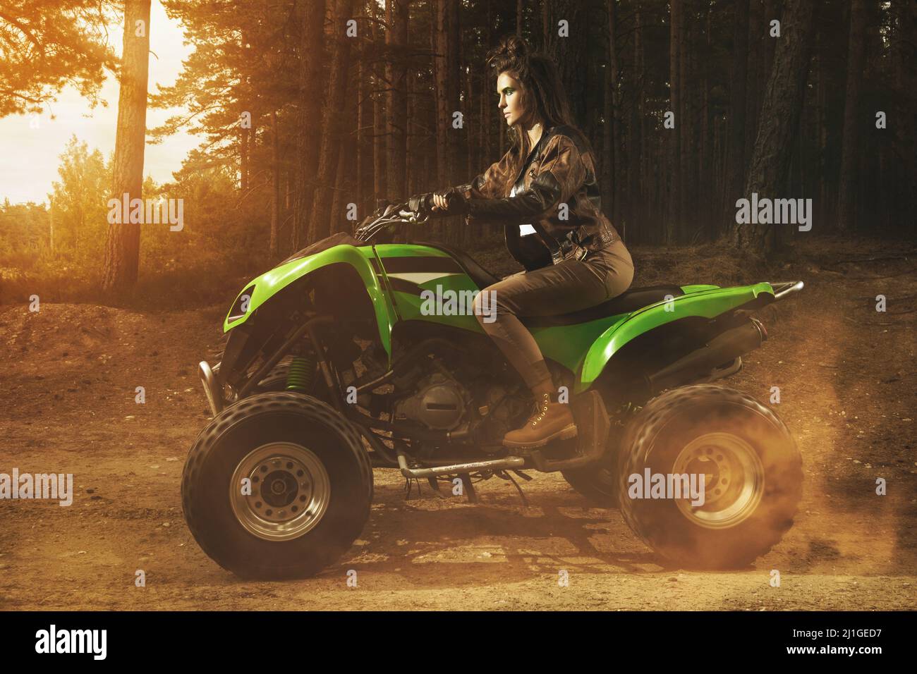 Stylish and beautiful woman and the ATV Stock Photo - Alamy
