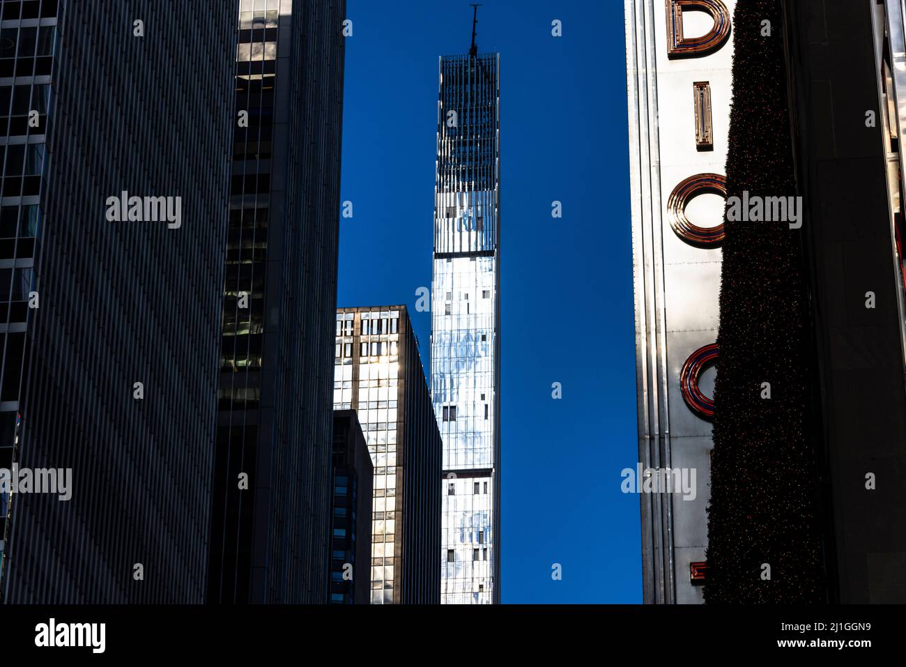The sun illuminates the newly built luxury high-rise residential ...