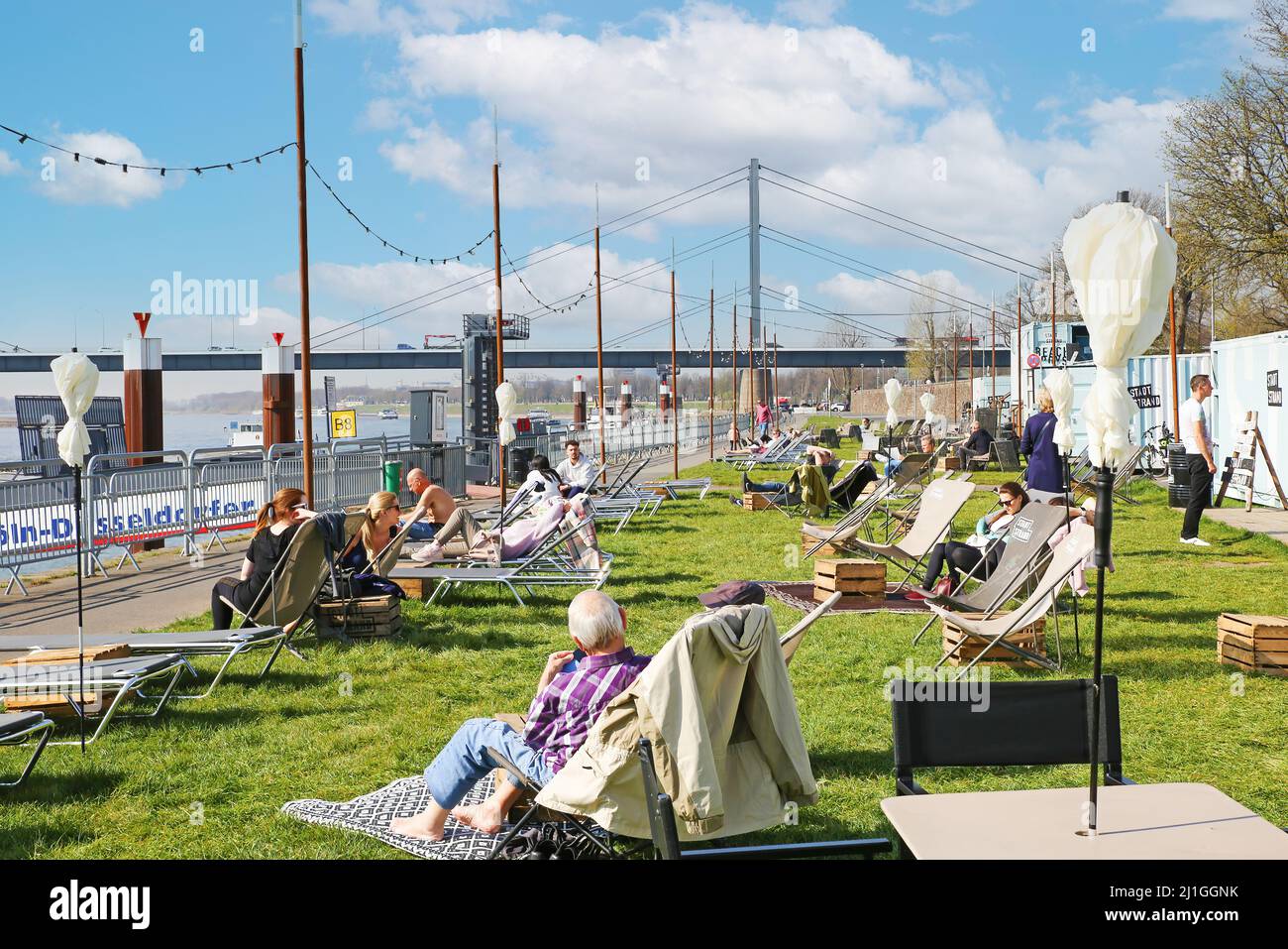 Düsseldorf (Stadtstrand), Germany - March 21.2022: View on green lawn ...