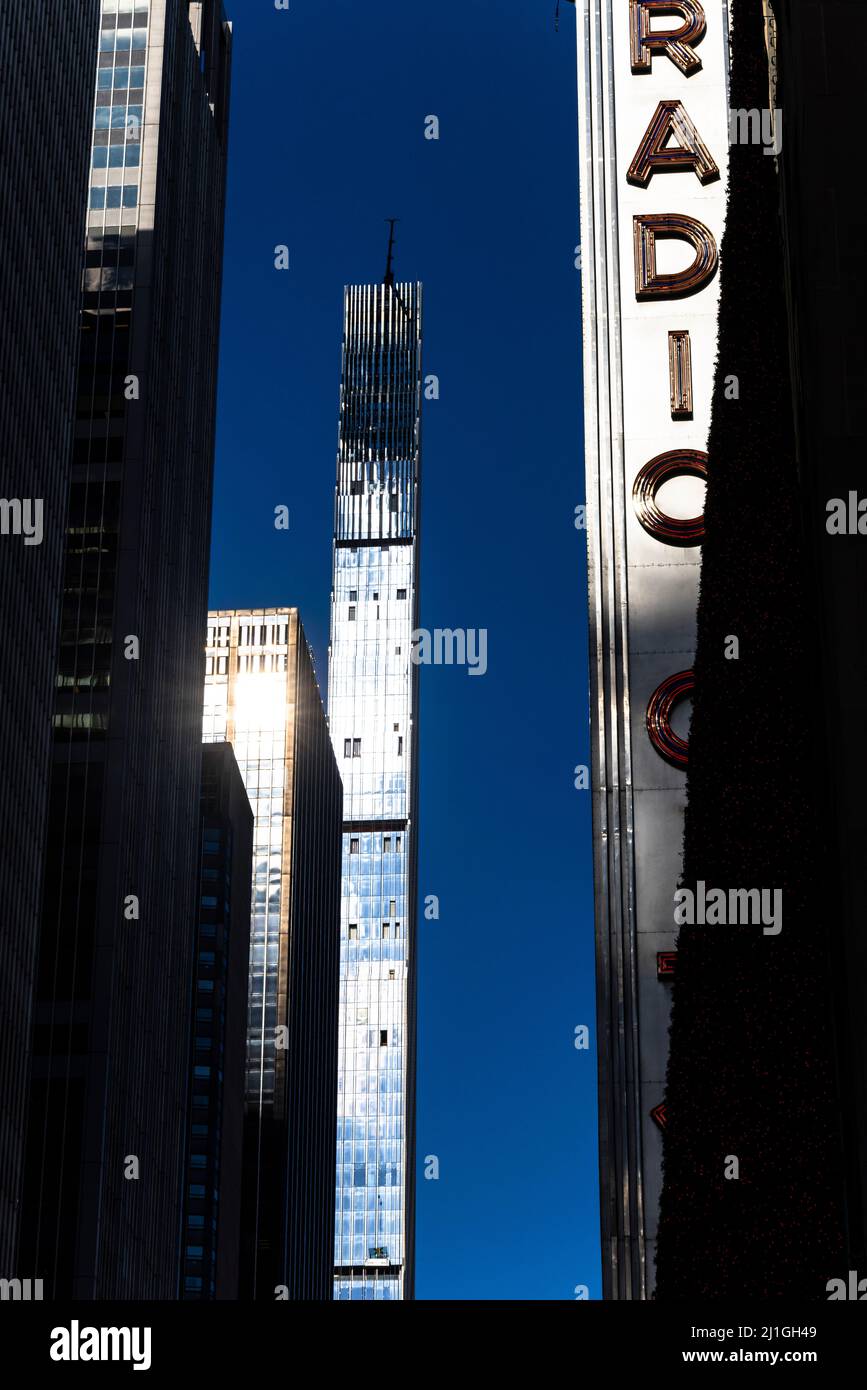 The sun illuminates the newly built luxury high-rise residential ...