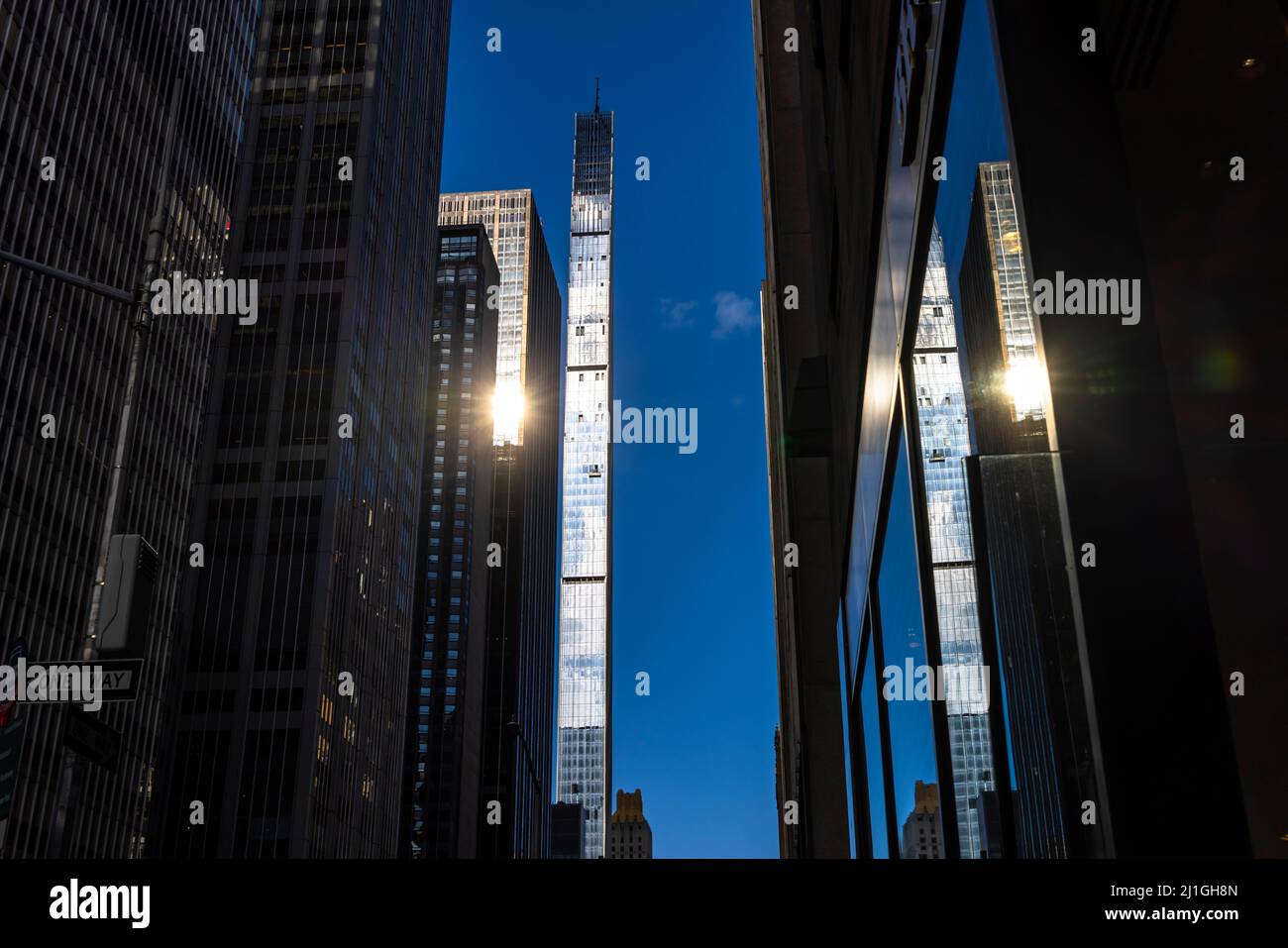 The sun illuminates the newly built luxury high-rise residential ...