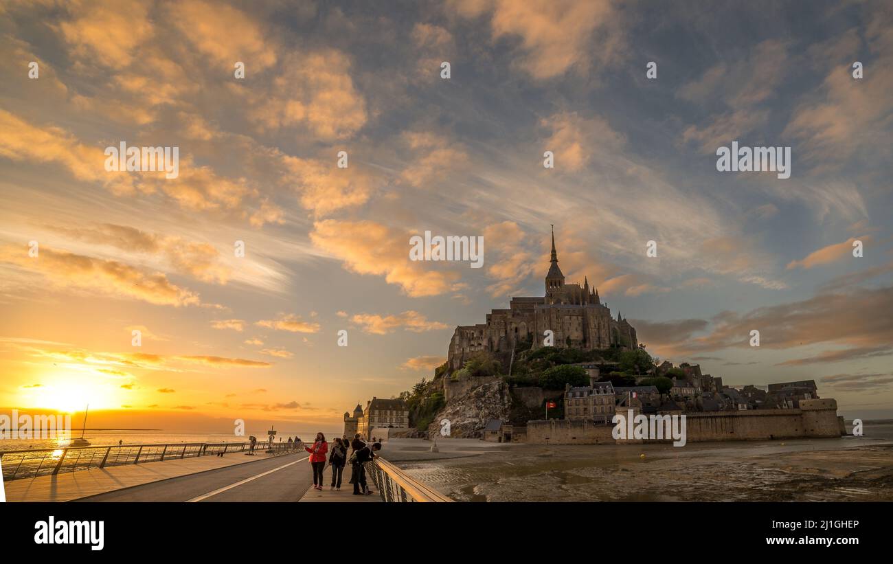 A beautiful view of tourists at Le mont Saint Michel tidal island ...