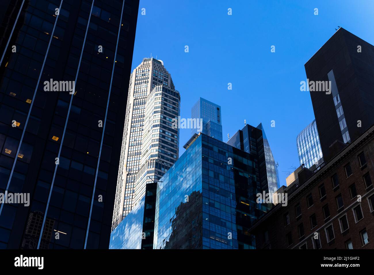 Ultra luxury high-rise residential buildings stand among Midtown ...