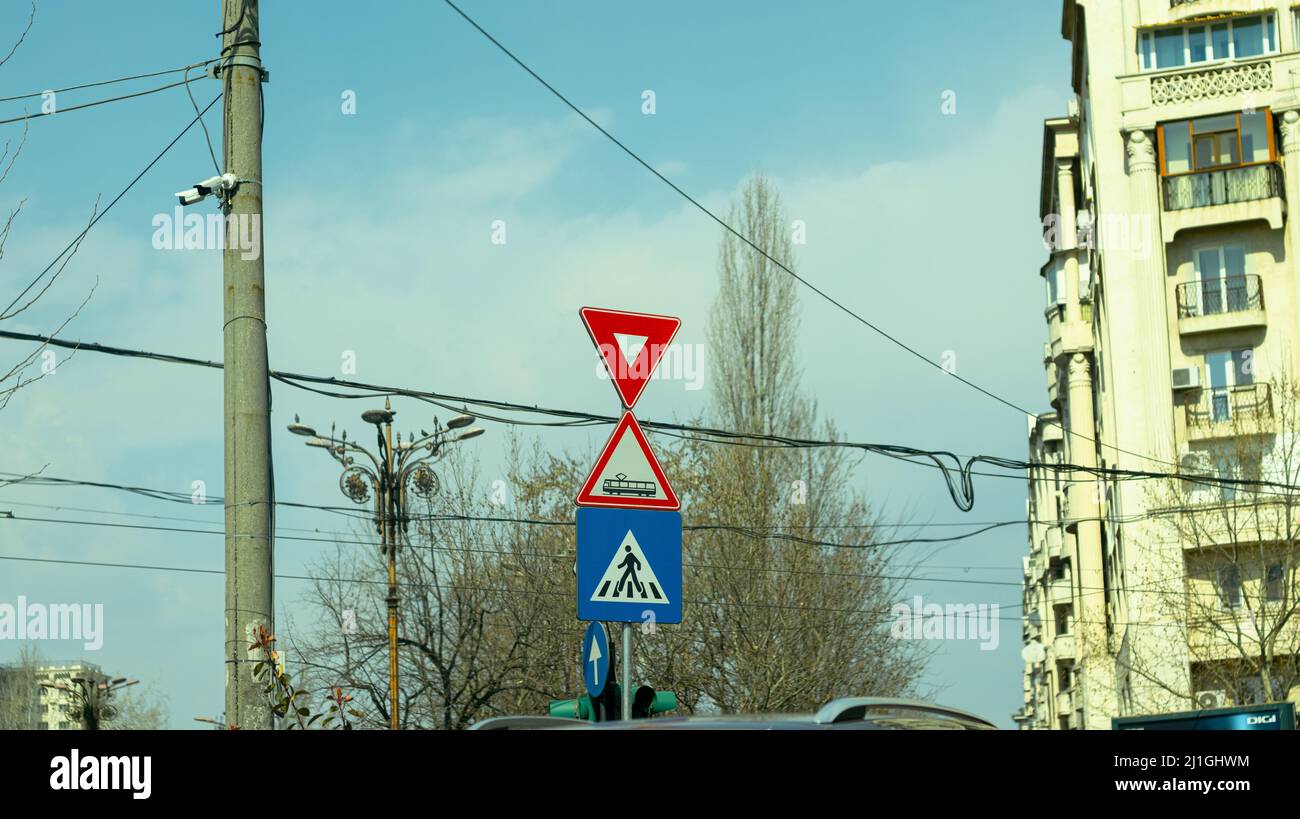 Intersection with traffic signs Stock Photo - Alamy