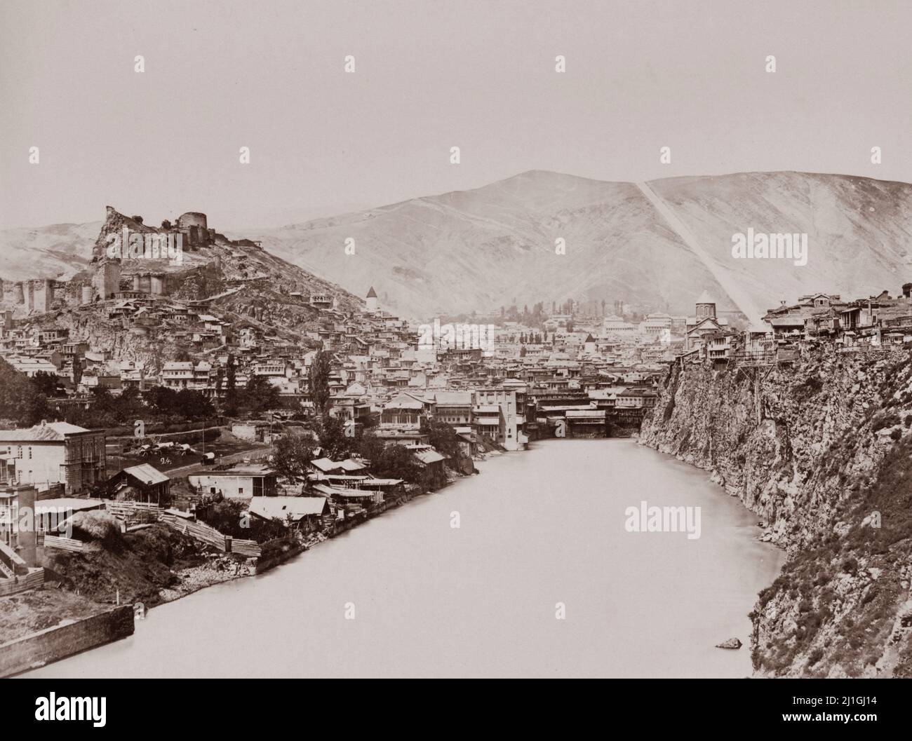 Vintage photo of view of the outskirts of Tiflis and the Kura river ...