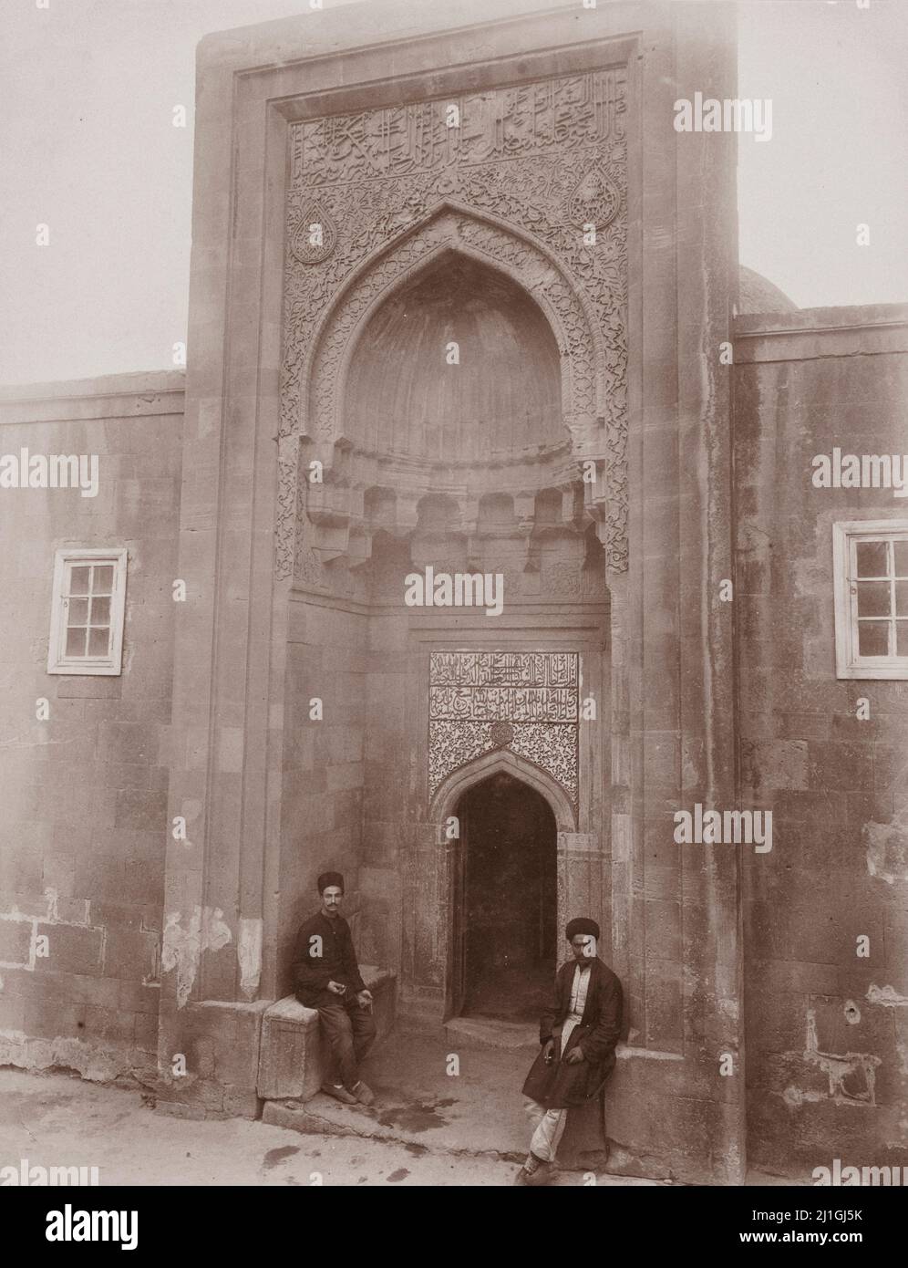 19th-century photo of Baku. The entrance to the mosque decorated with a ...