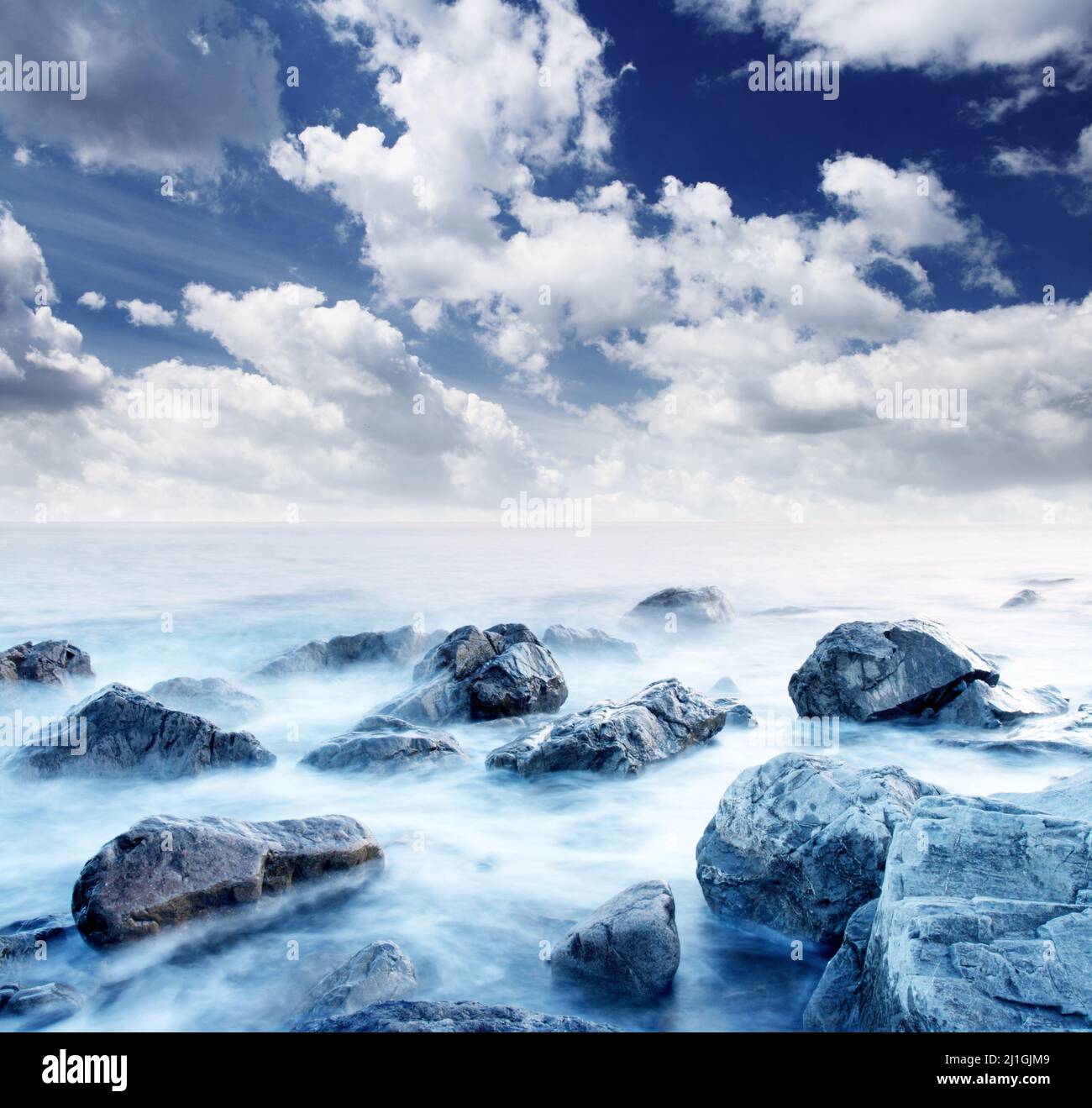 Beautiful sea and clouds sky with sun Stock Photo - Alamy