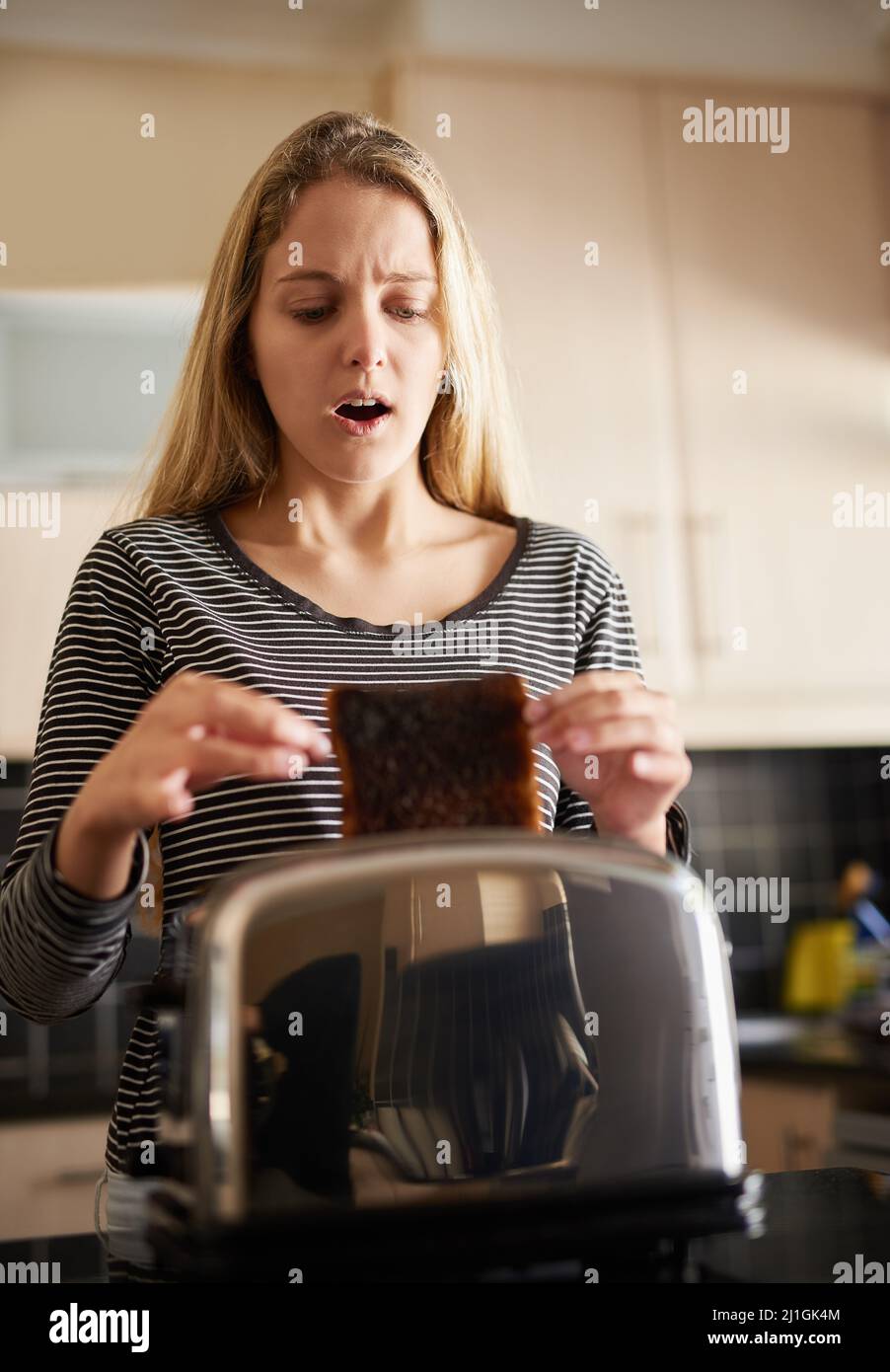 Shocked young woman looking burnt hi-res stock photography and images ...