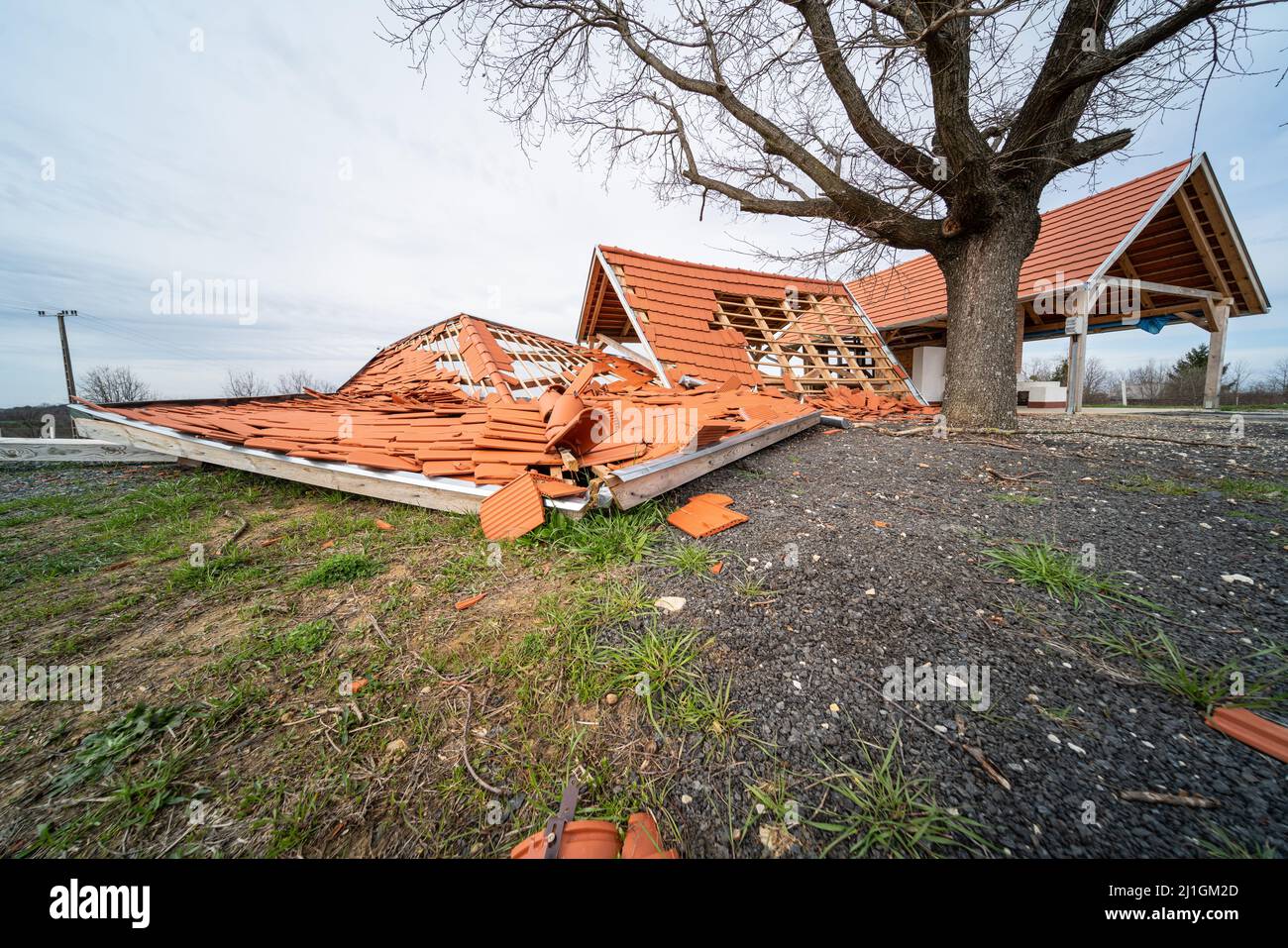 Broken roof after a storm Stock Photo - Alamy