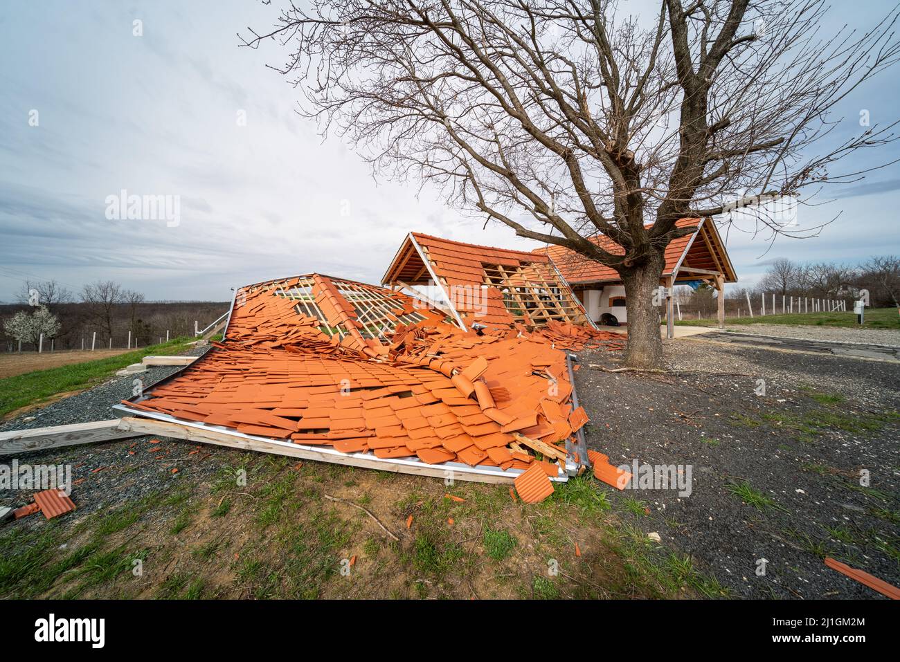 Broken roof after a storm Stock Photo - Alamy