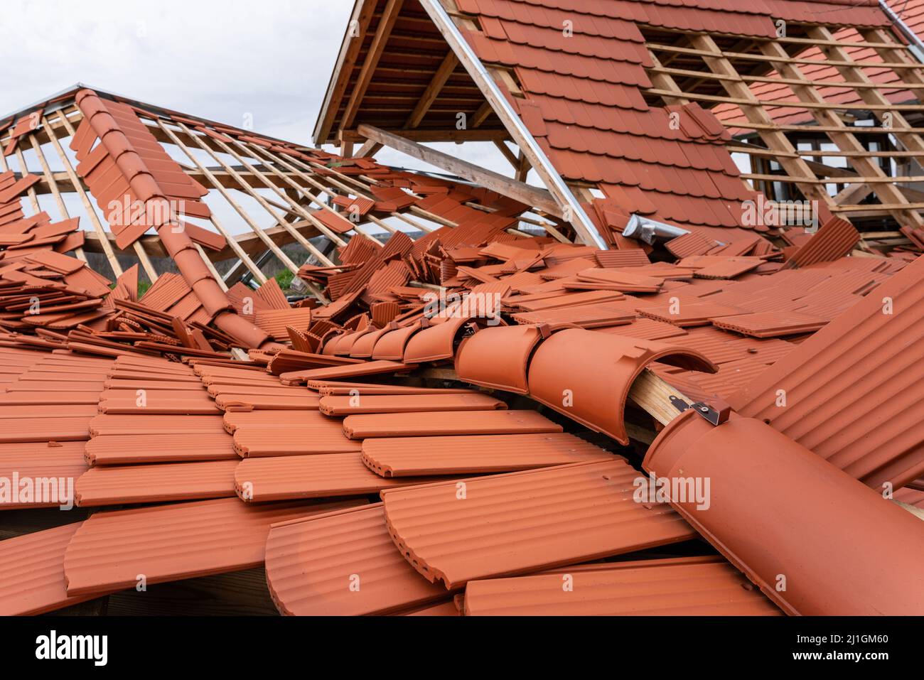 Broken roof after a storm Stock Photo - Alamy