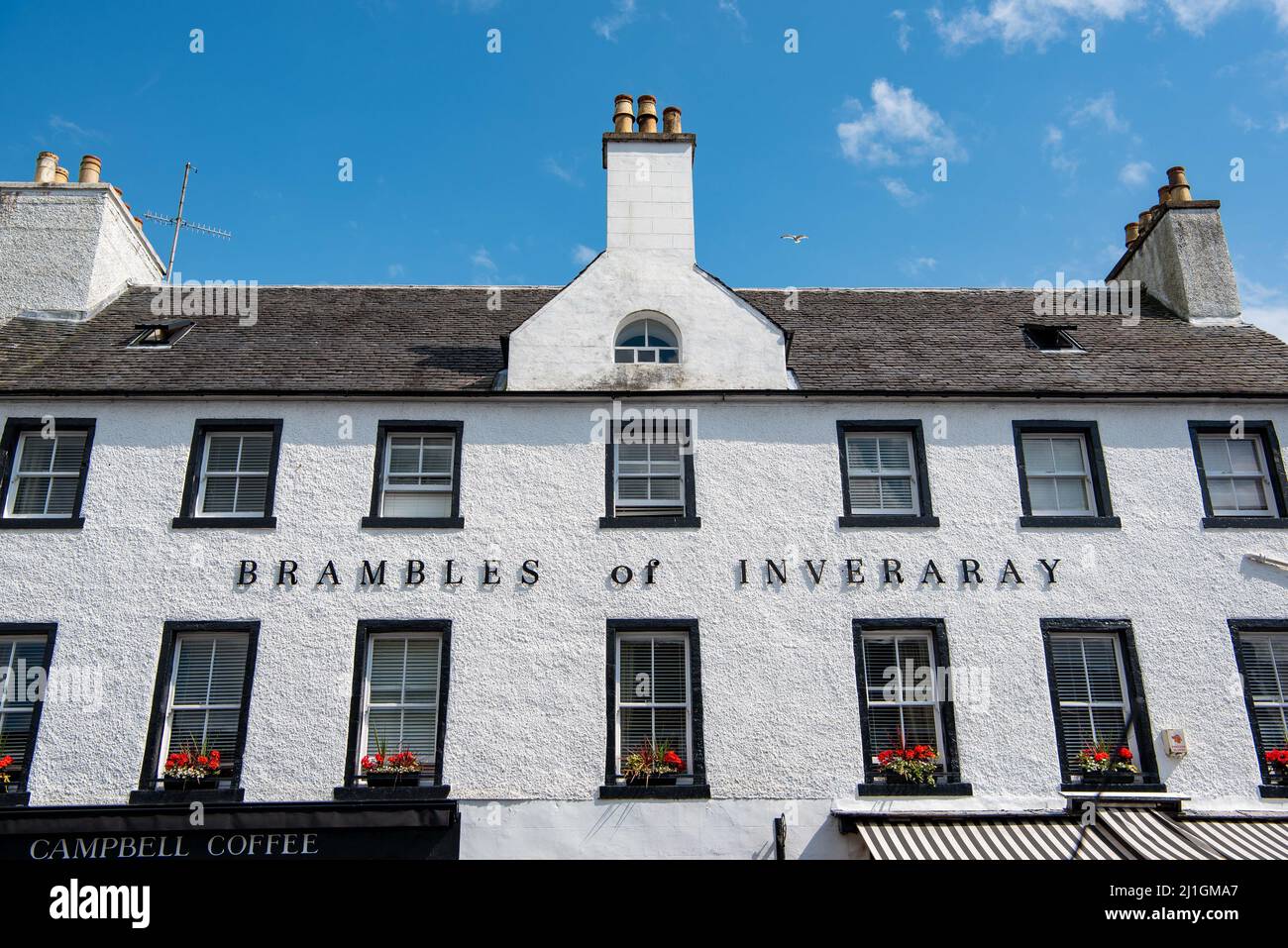 The exterior of a building with the text Brambles of Inveraray on the ...