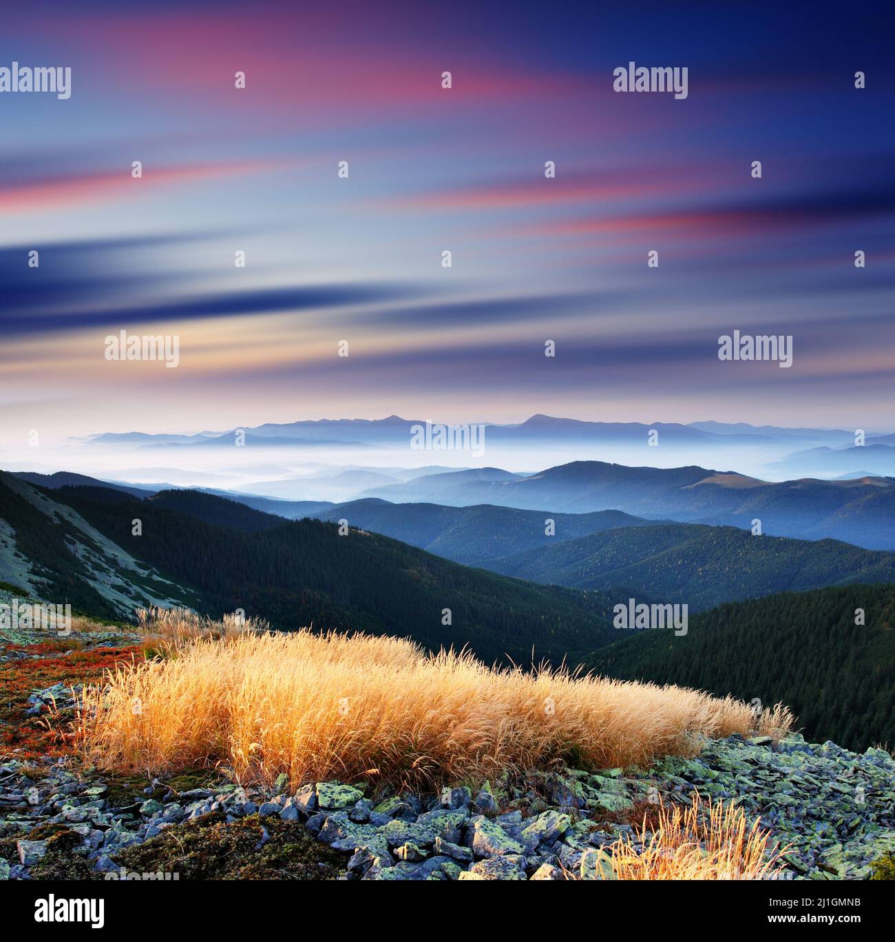 Majestic sunset in the mountains landscape. HDR image Stock Photo - Alamy