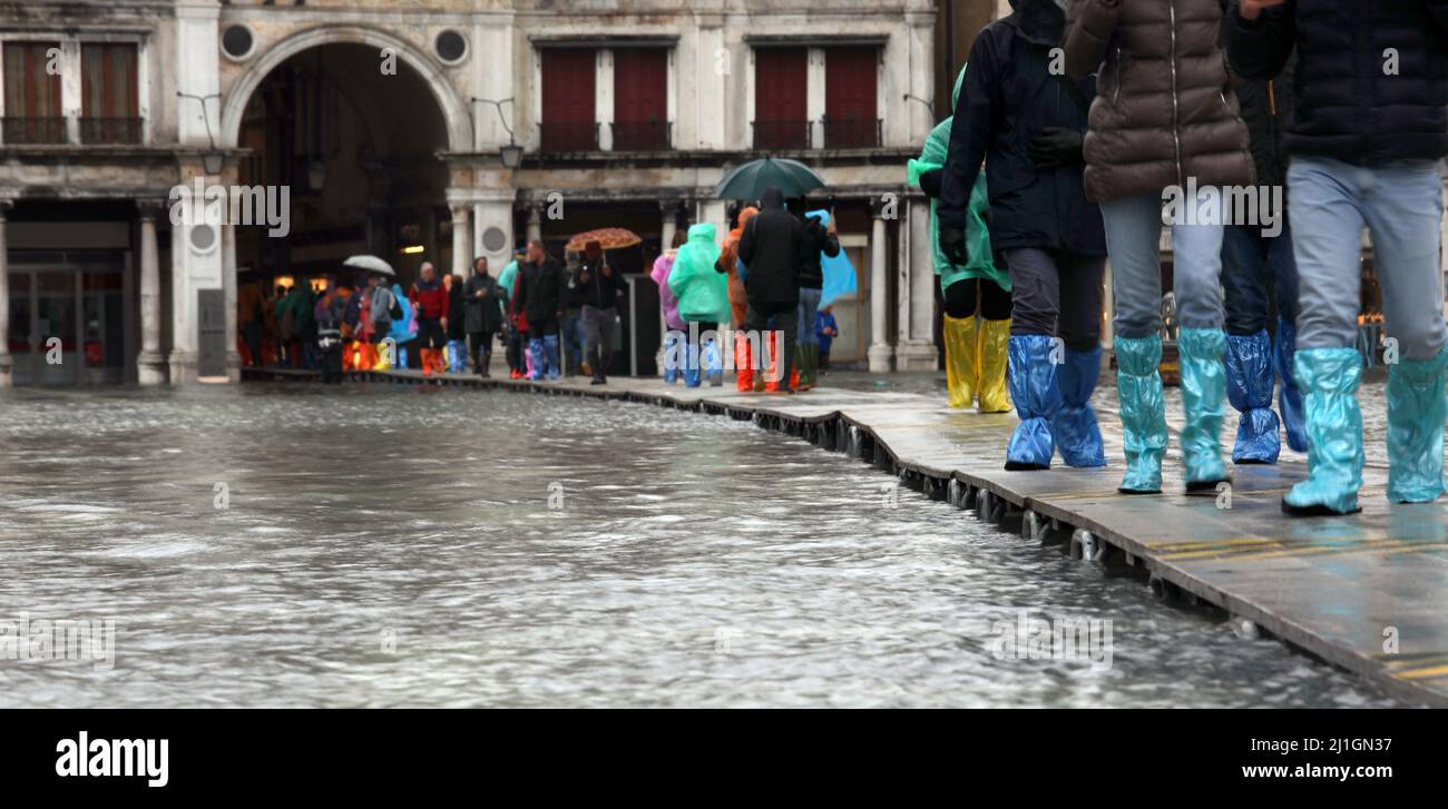 Elevated walkways for walking during high tide in San Marco square in ...