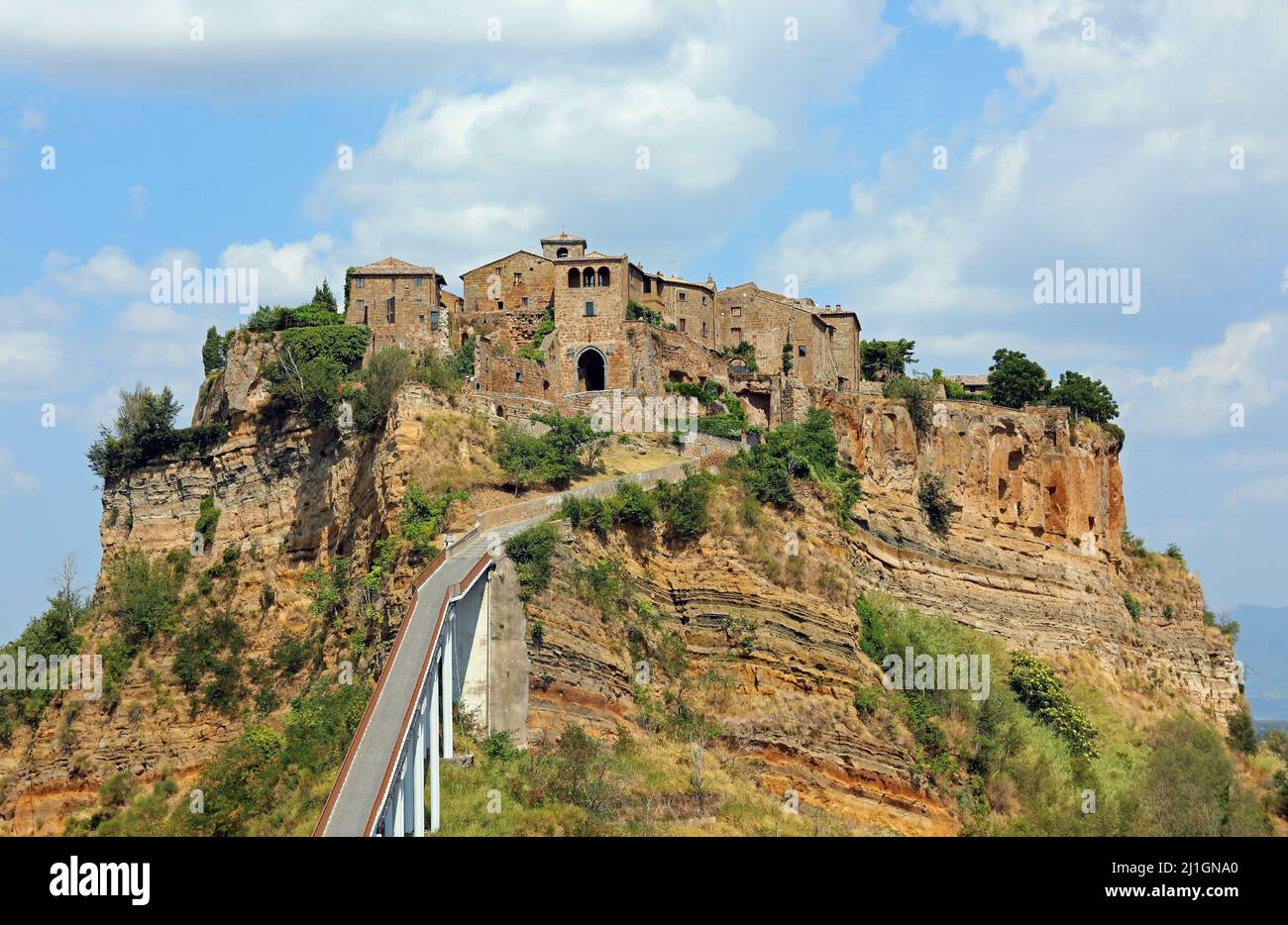 Ancient village on the hill called Civita di Bagnoregio in Italy and a ...