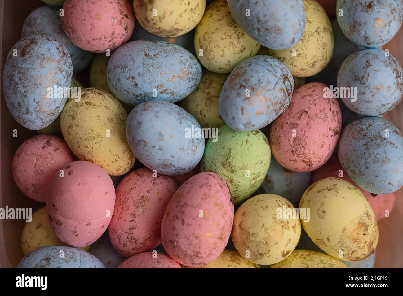 closeup of colorful small eggs background. Easter wallpaper Stock Photo ...