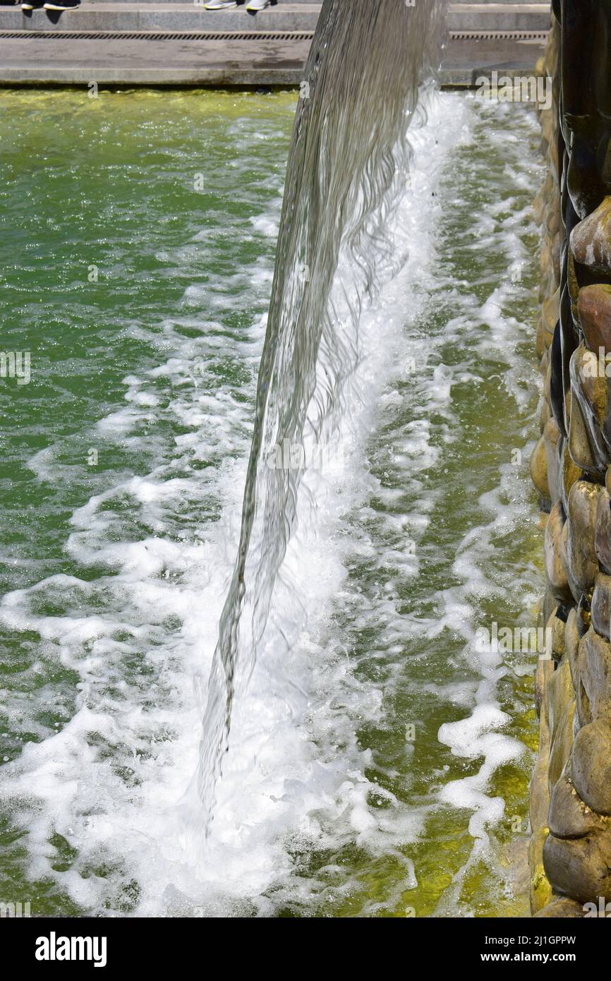 landscape of beautiful Artificial waterfall in garden at the public ...
