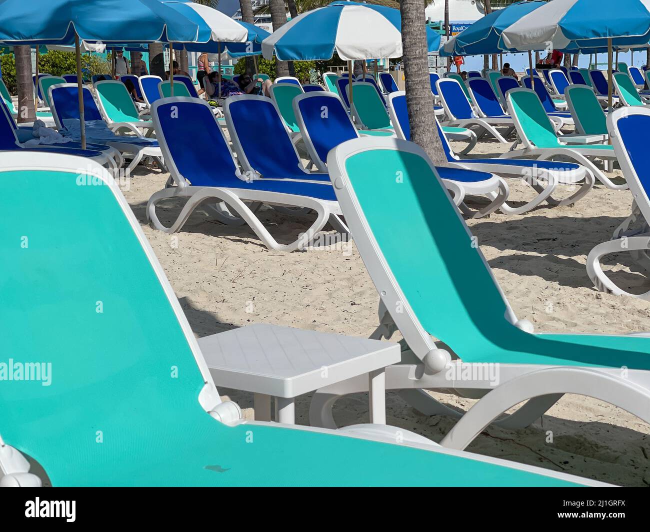 Bahamas - September 16, 2021: Lounge chairs on the beach on Coco Cay in ...