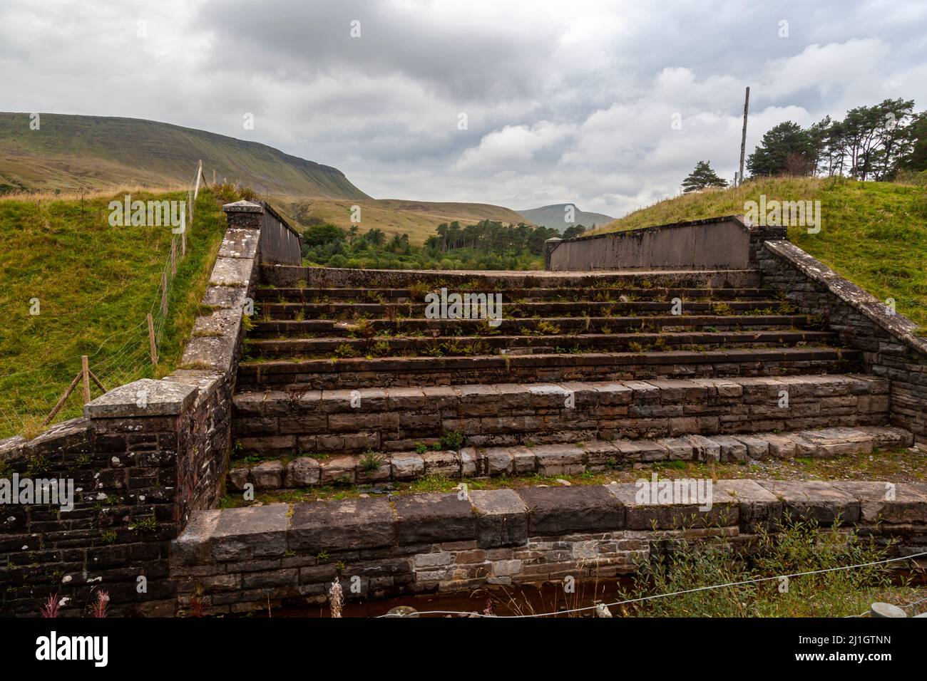 The old spillway of the now disused and relandscaped lower Neuadd ...