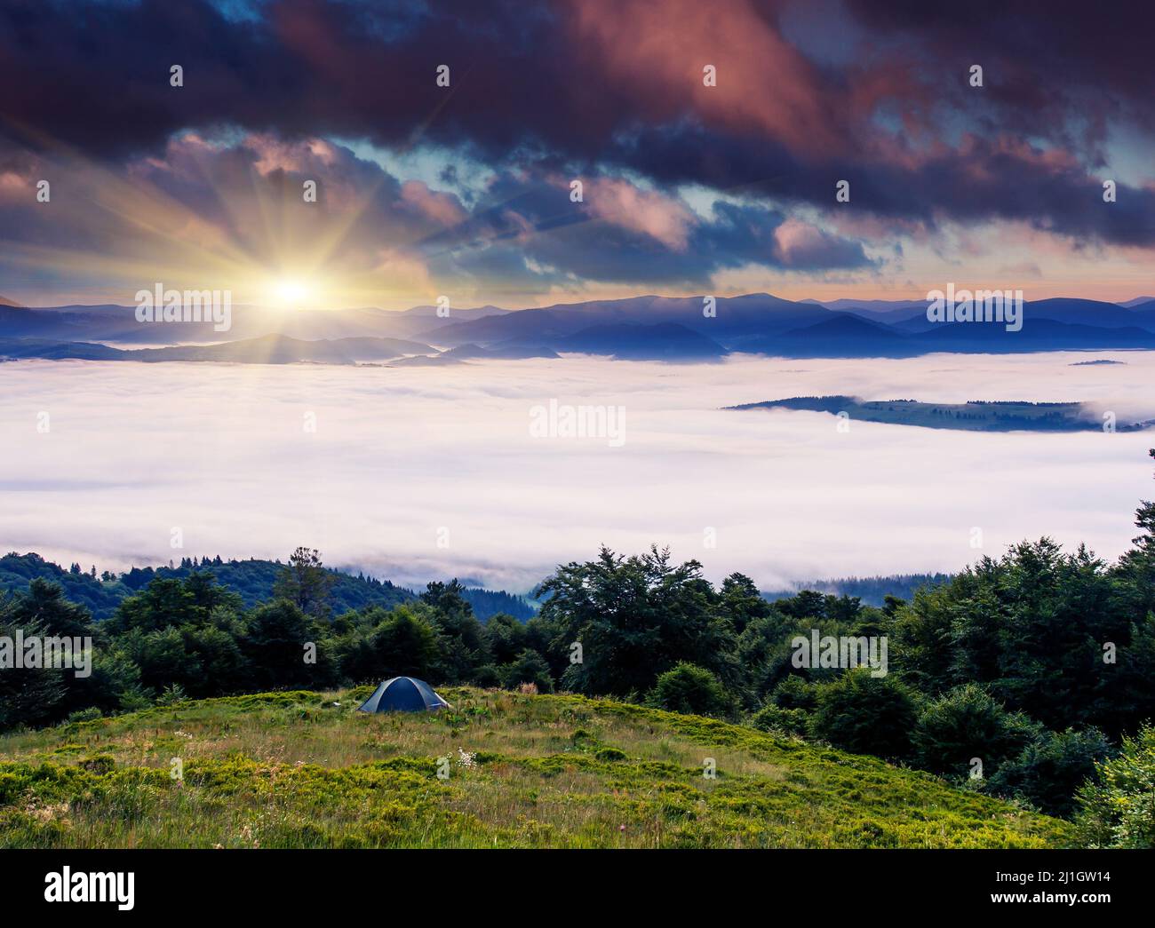 Majestic sunset in the mountains landscape. Overcast sky before storm ...