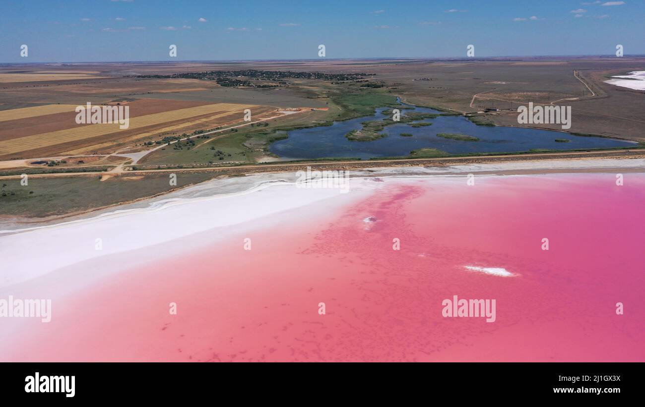 Aerial view of White salt on the shores of the island in Pink Island ...