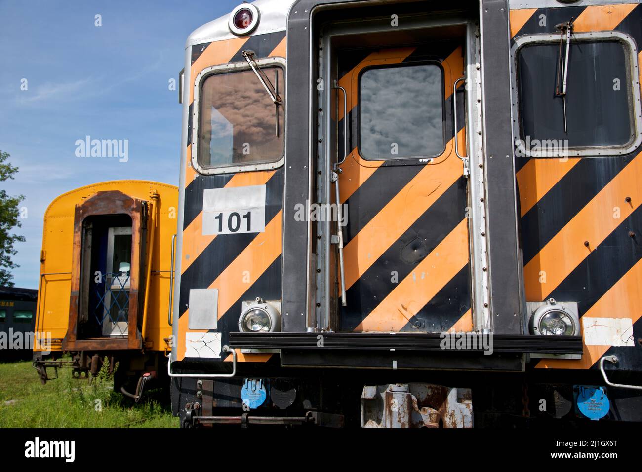 Close up of the passenger train is parked on the railway track ...