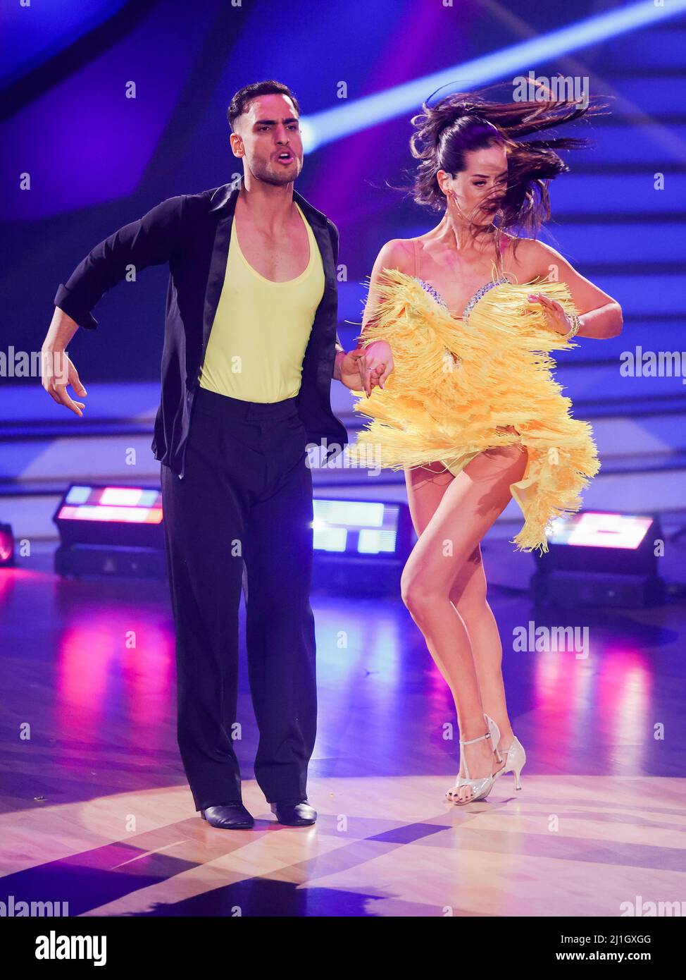 Cologne, Germany. 25th Mar, 2022. Timur Ülker, actor, and Malika ...