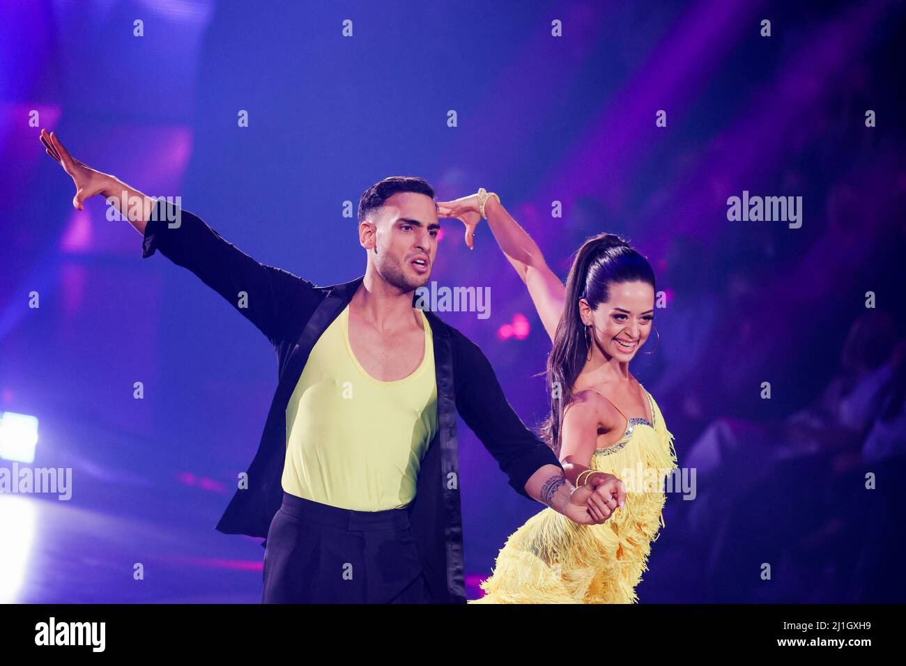 Cologne, Germany. 25th Mar, 2022. Timur Ülker, actor, and Malika ...