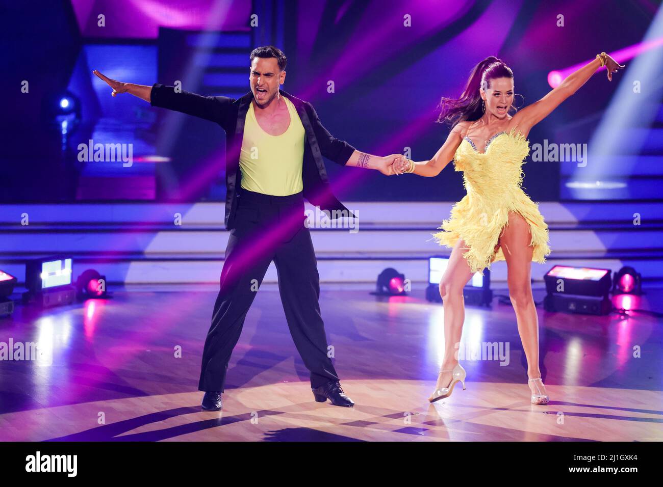 Cologne, Germany. 25th Mar, 2022. Timur Ülker, actor, and Malika ...